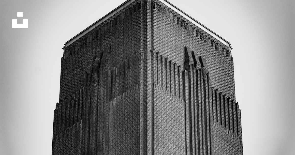 Foto Un Edificio Alto Con Una Torre Imagen Tate Moderno Gratis En