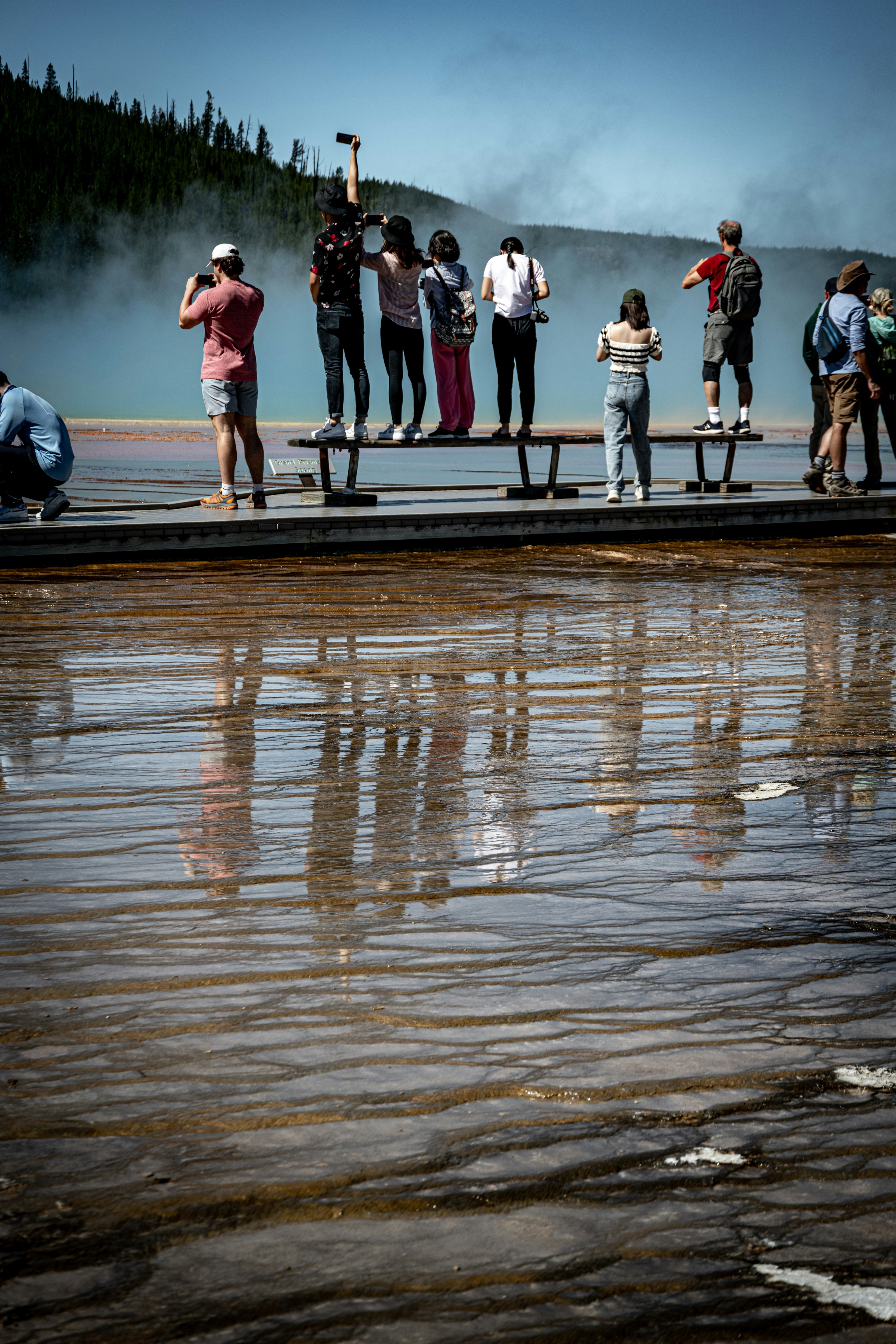 A group of people standing on a dock photo – Free Yellowstone national ...