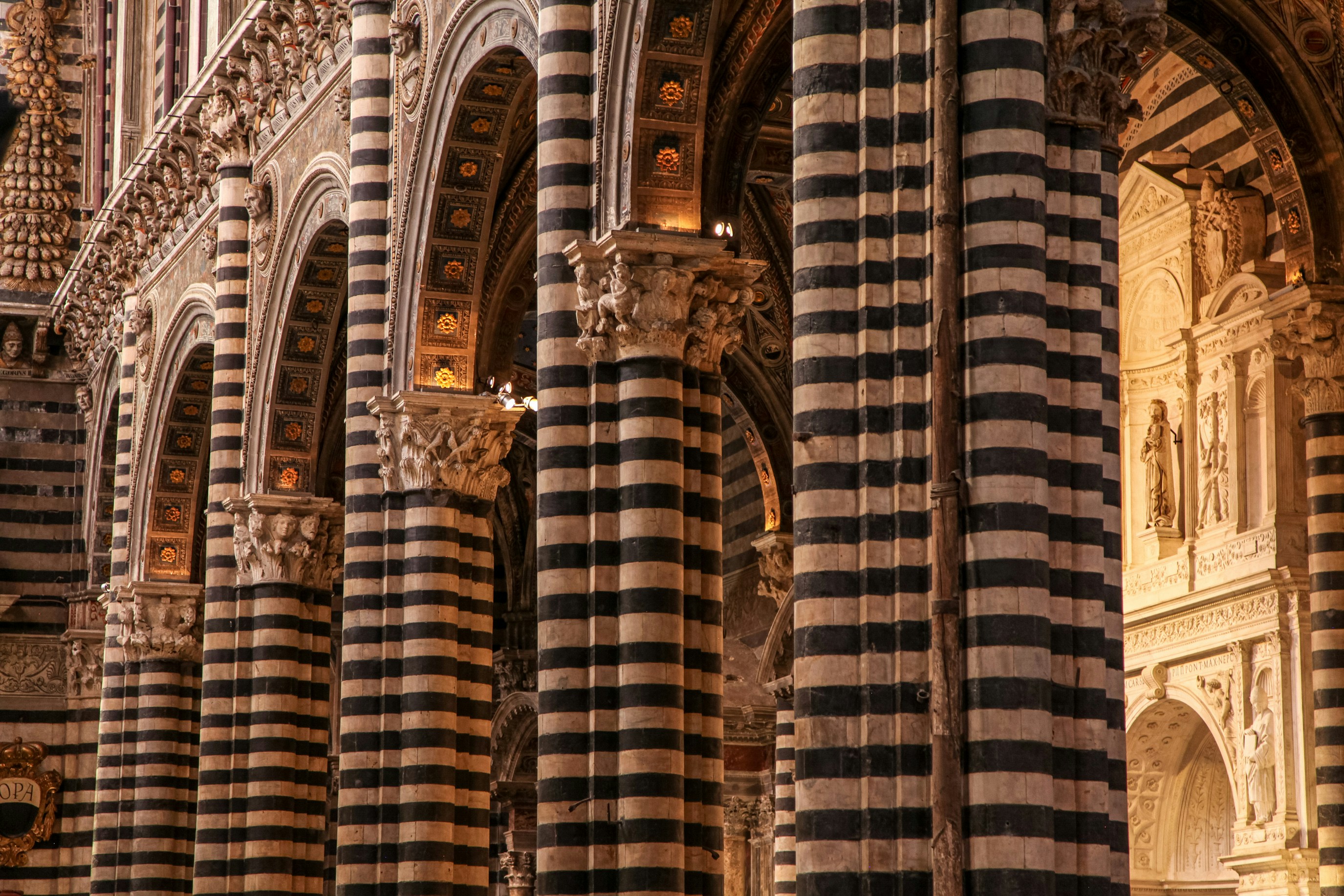 A building with many statues photo – Free Duomo di siena Image on Unsplash