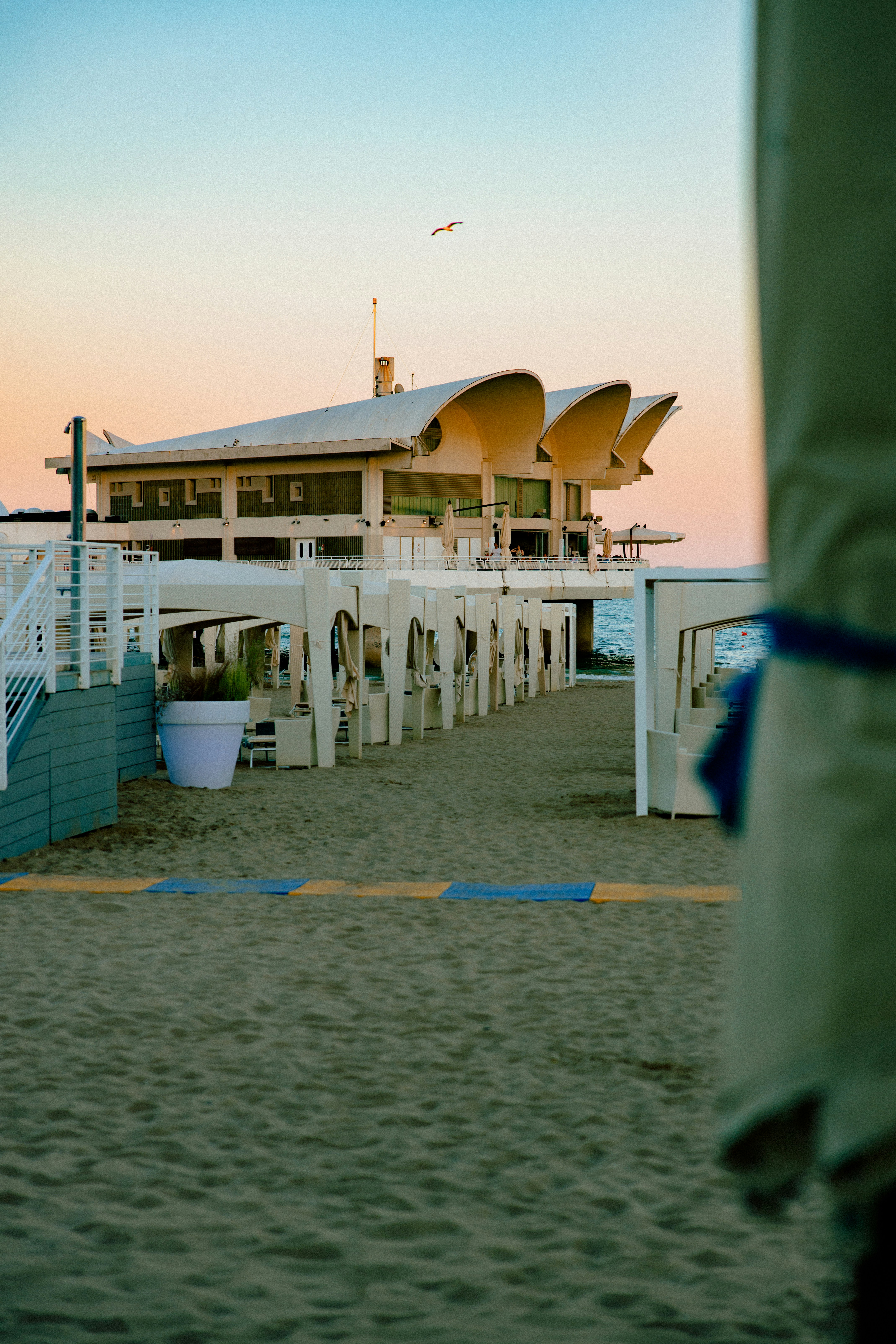 Sunset Arches over a Seaside Pavilion