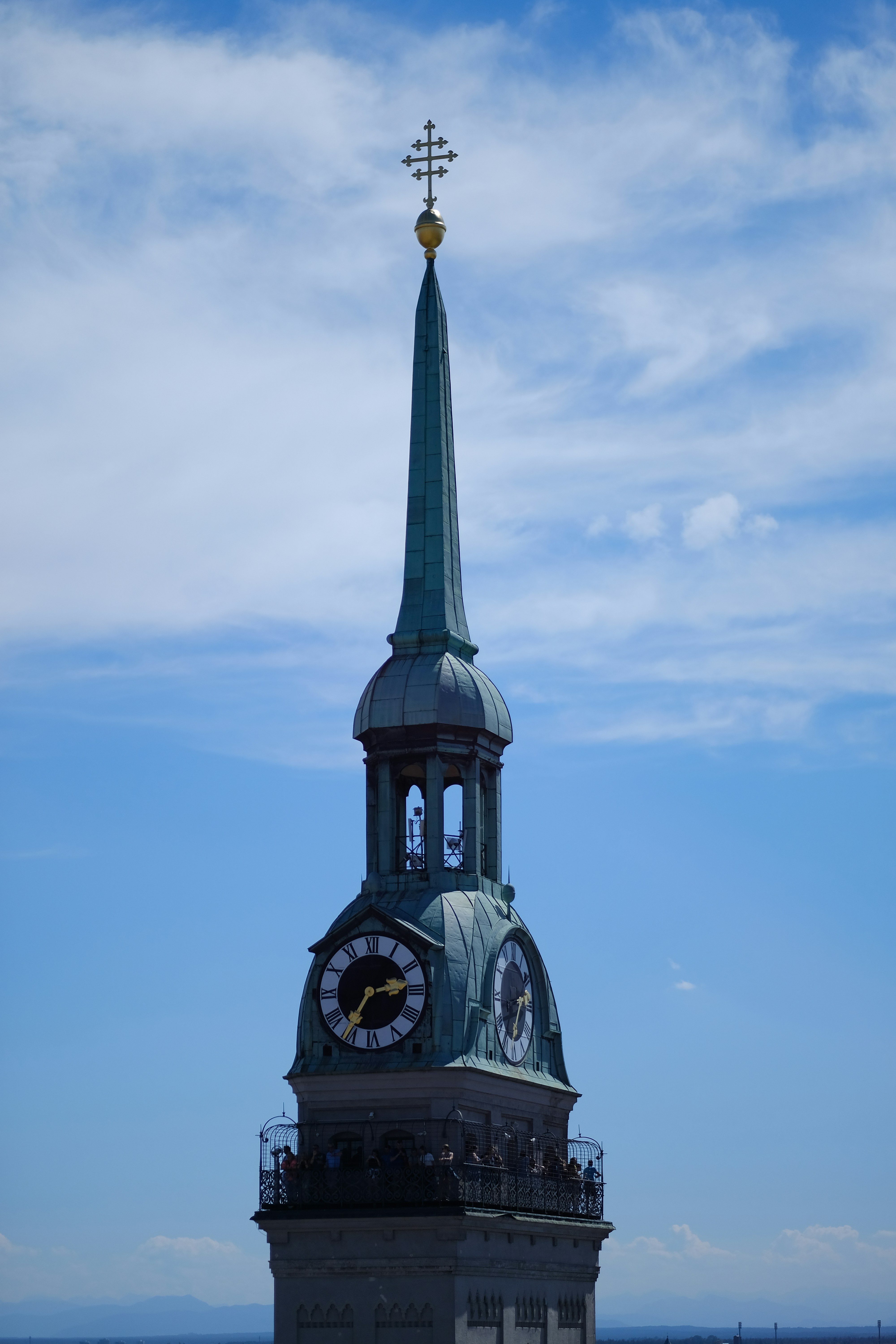 A clock tower with a weather vane photo – Free Blue Image on Unsplash