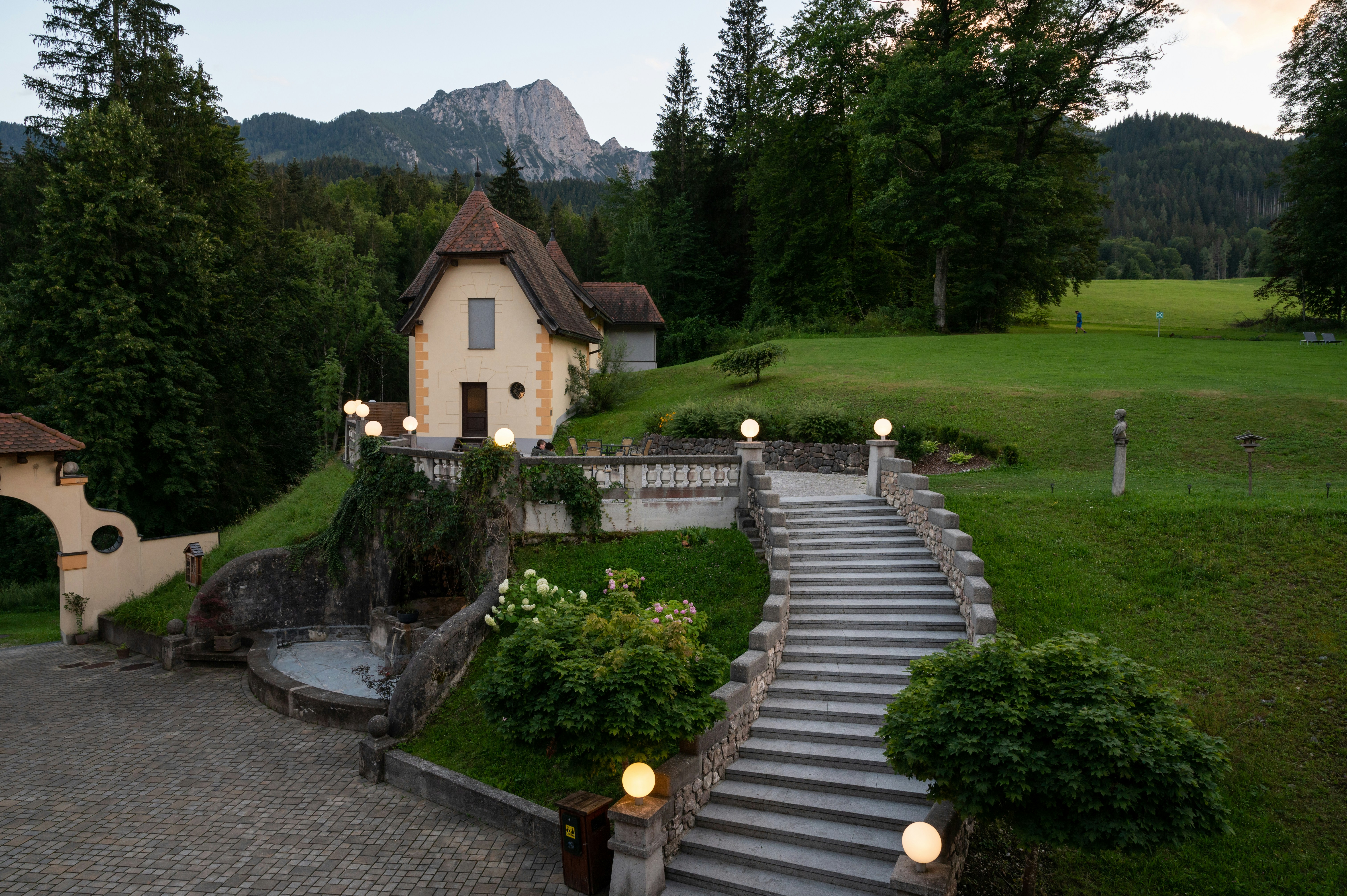 Terraced Villa at Dusk: A Quiet Retreat Framed by Pines and Peaks