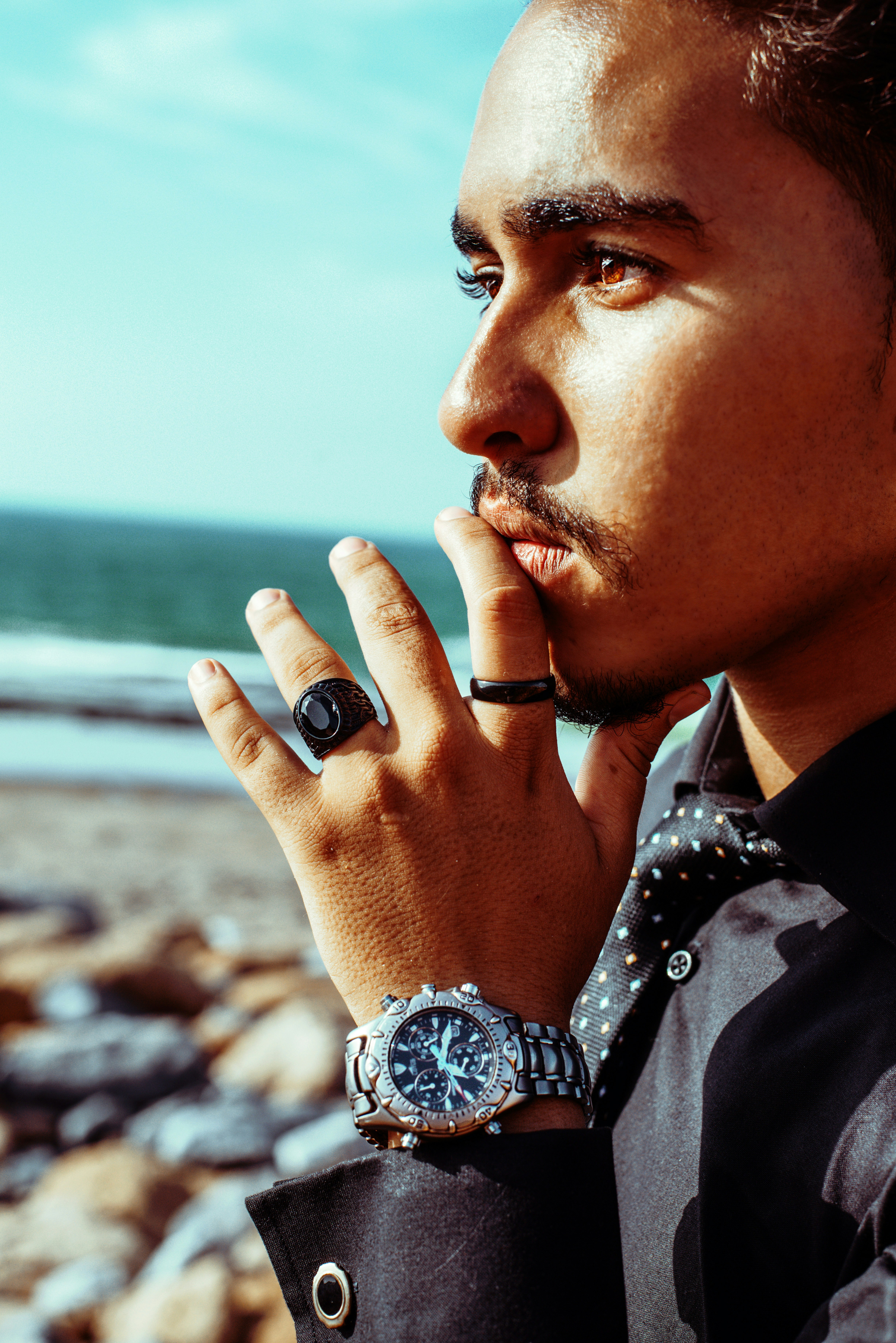 A man with a mustache holding up his middle finger photo – Free Life ...