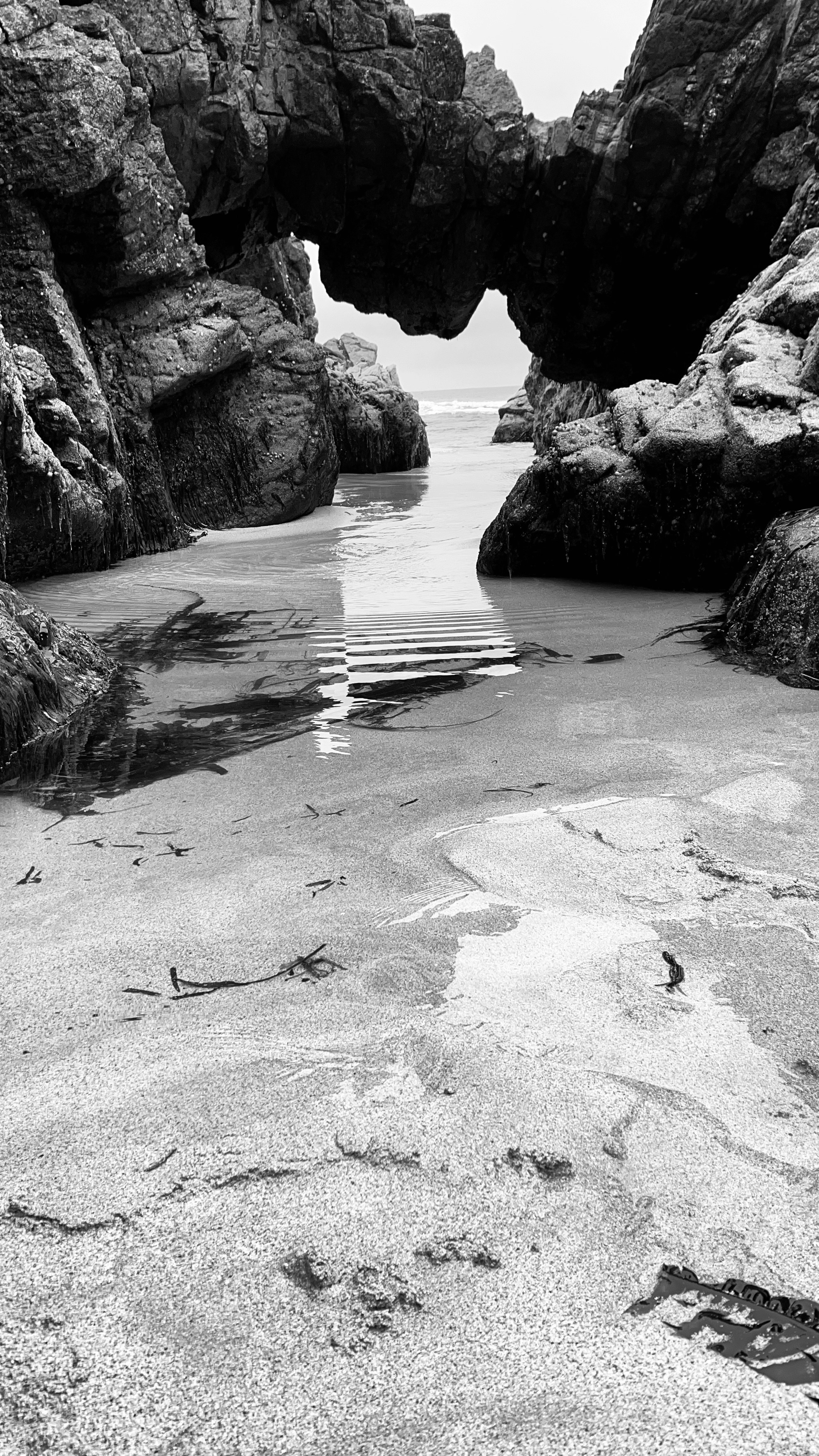 Archway of Tide: A Quiet Passage Between Stone Giants