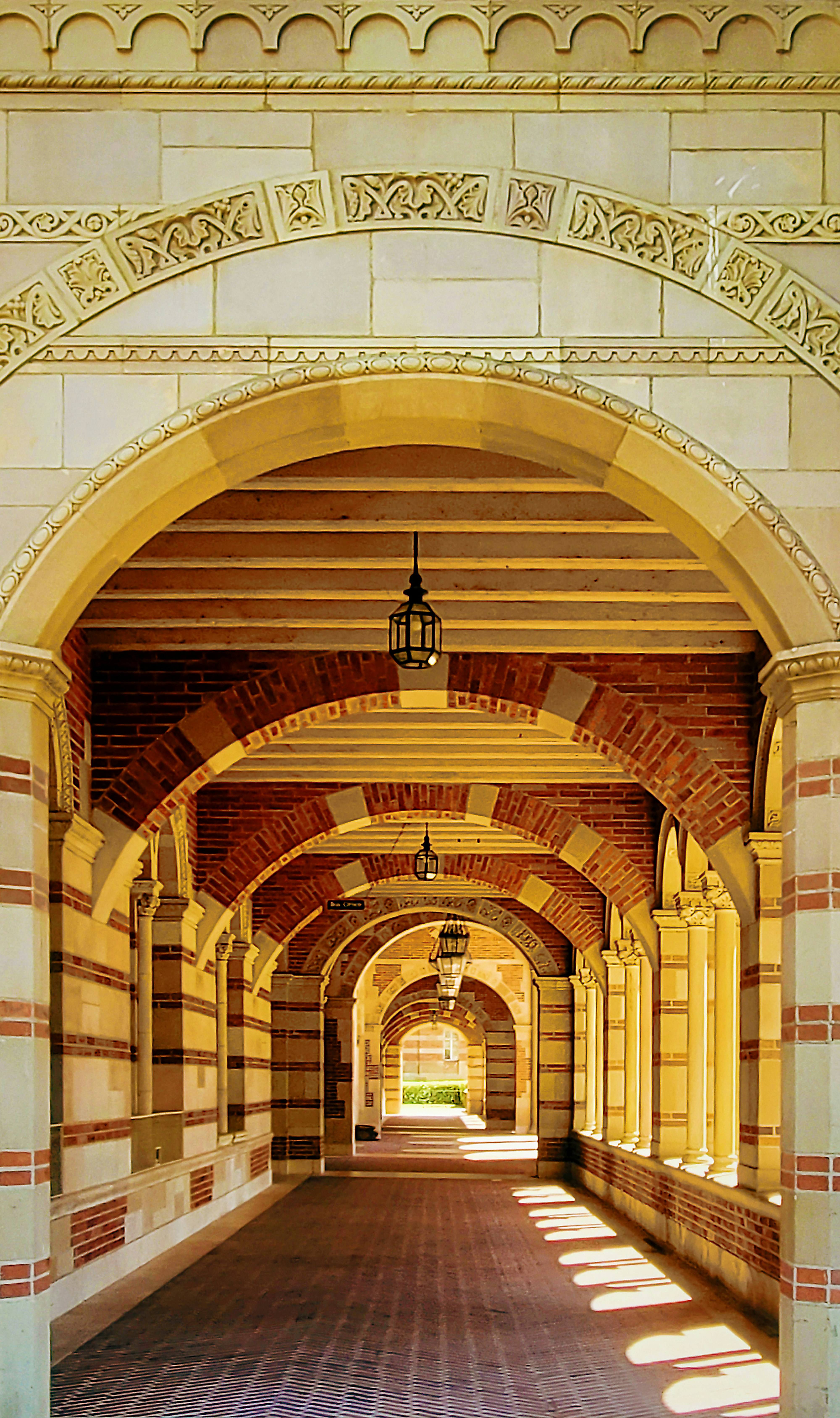 A hallway with a ceiling and arches photo – Free Ucla Image on Unsplash