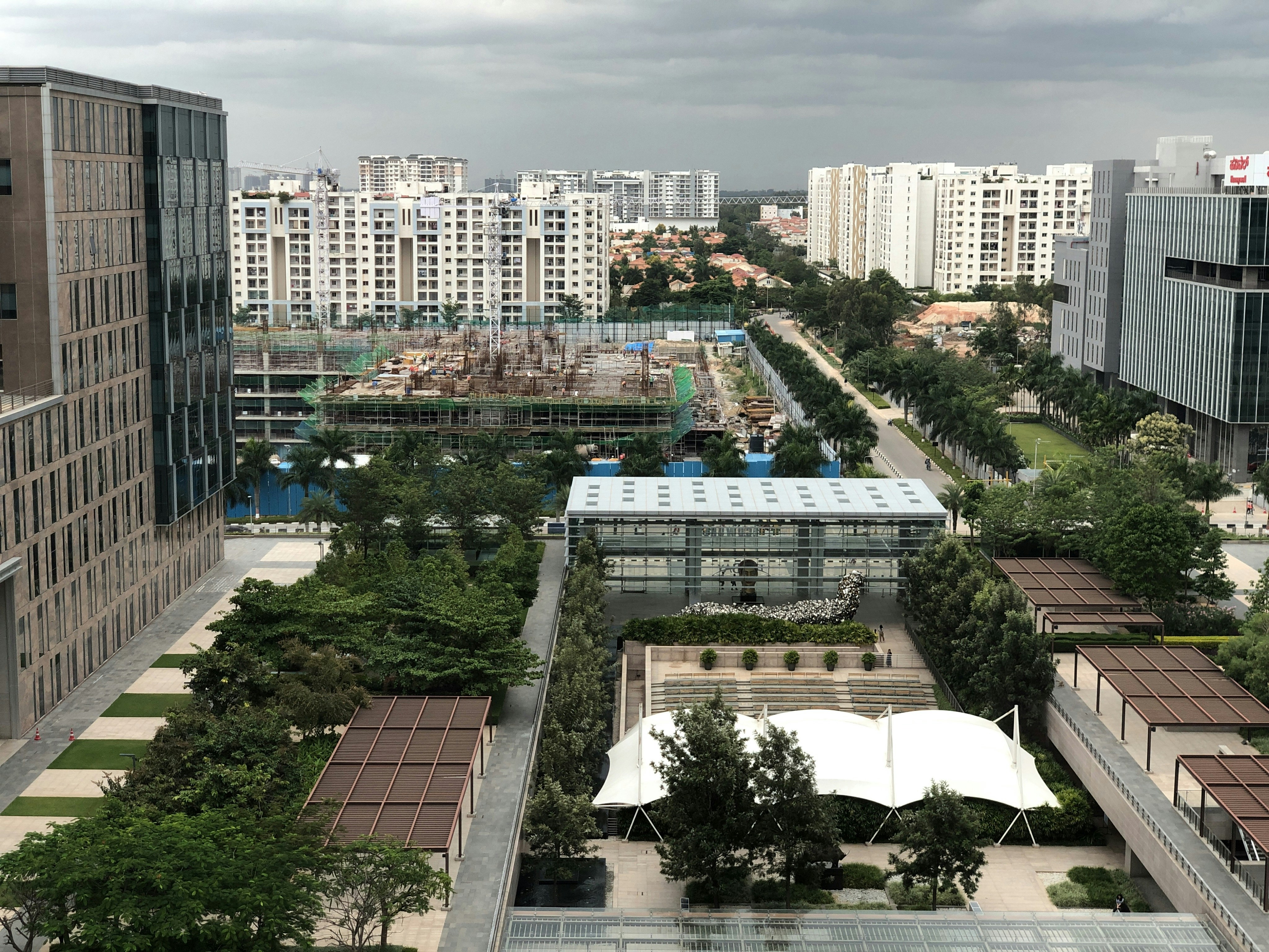 A large courtyard with buildings around it photo – Free Image on Unsplash