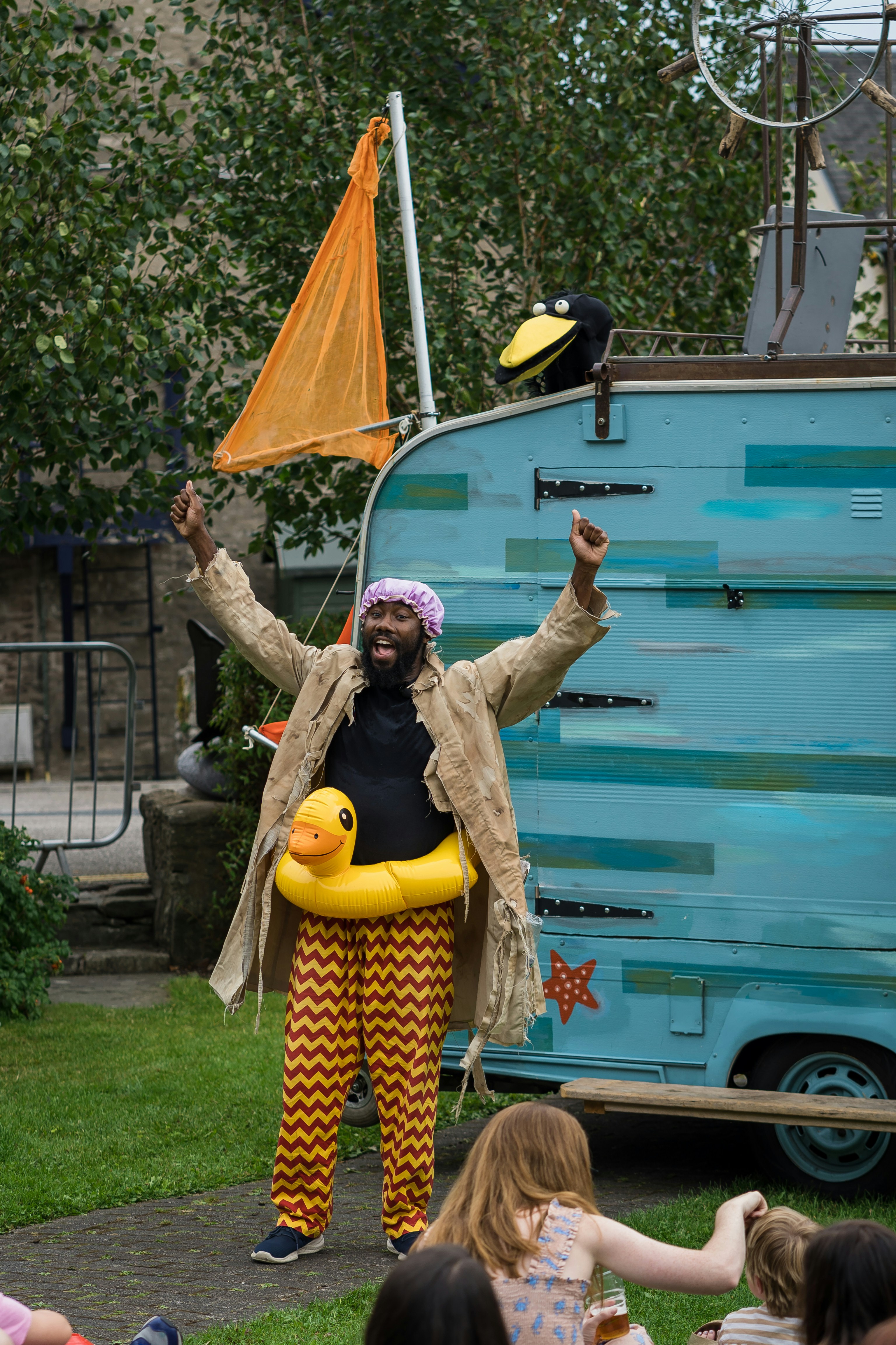 Carnival Cruiser: The Rubber Duck Rider Cheers a Colorful Mobile Stage