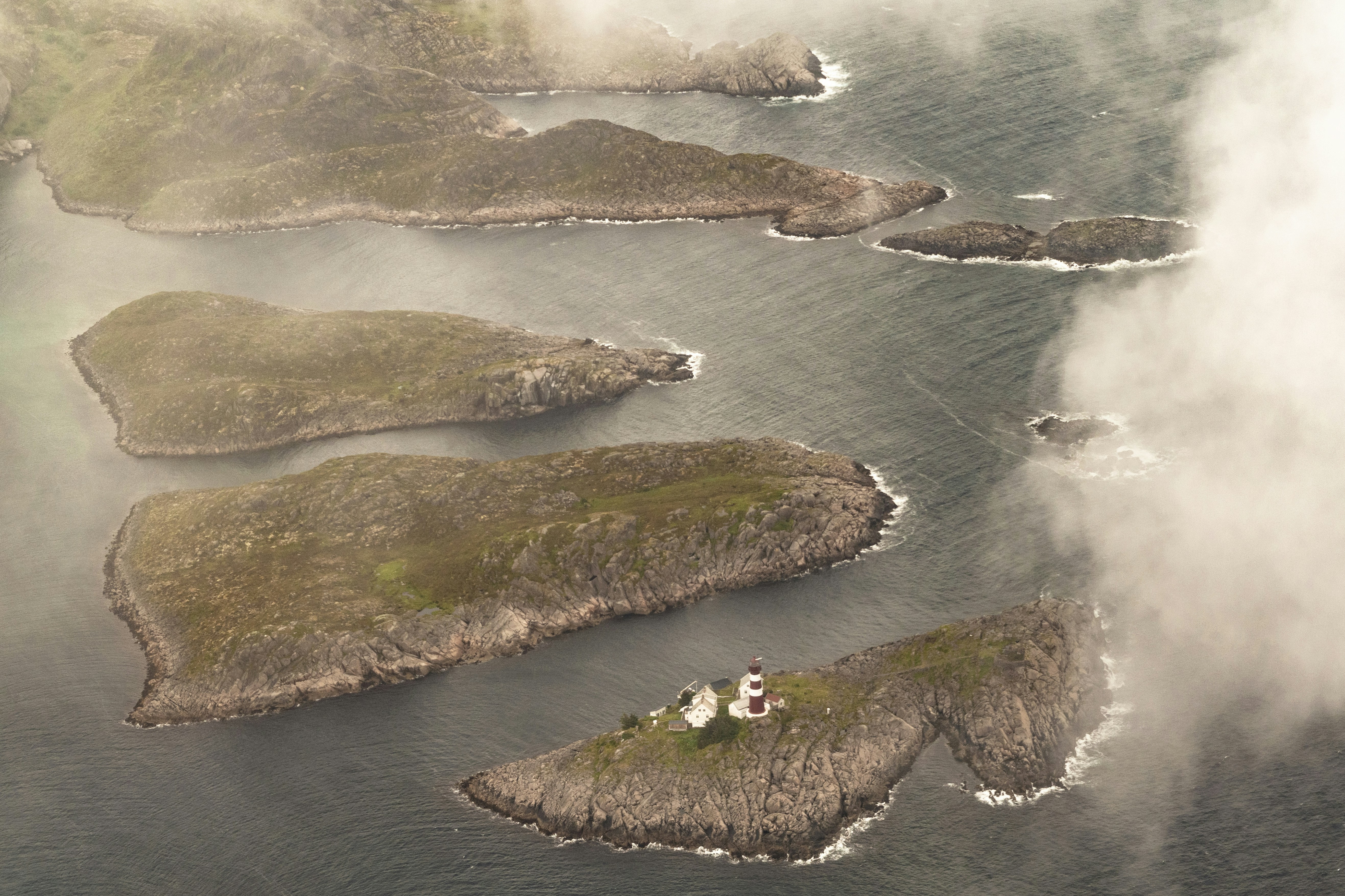 Beacon on a Mist-Wreathed Islet: Aerial Quiet