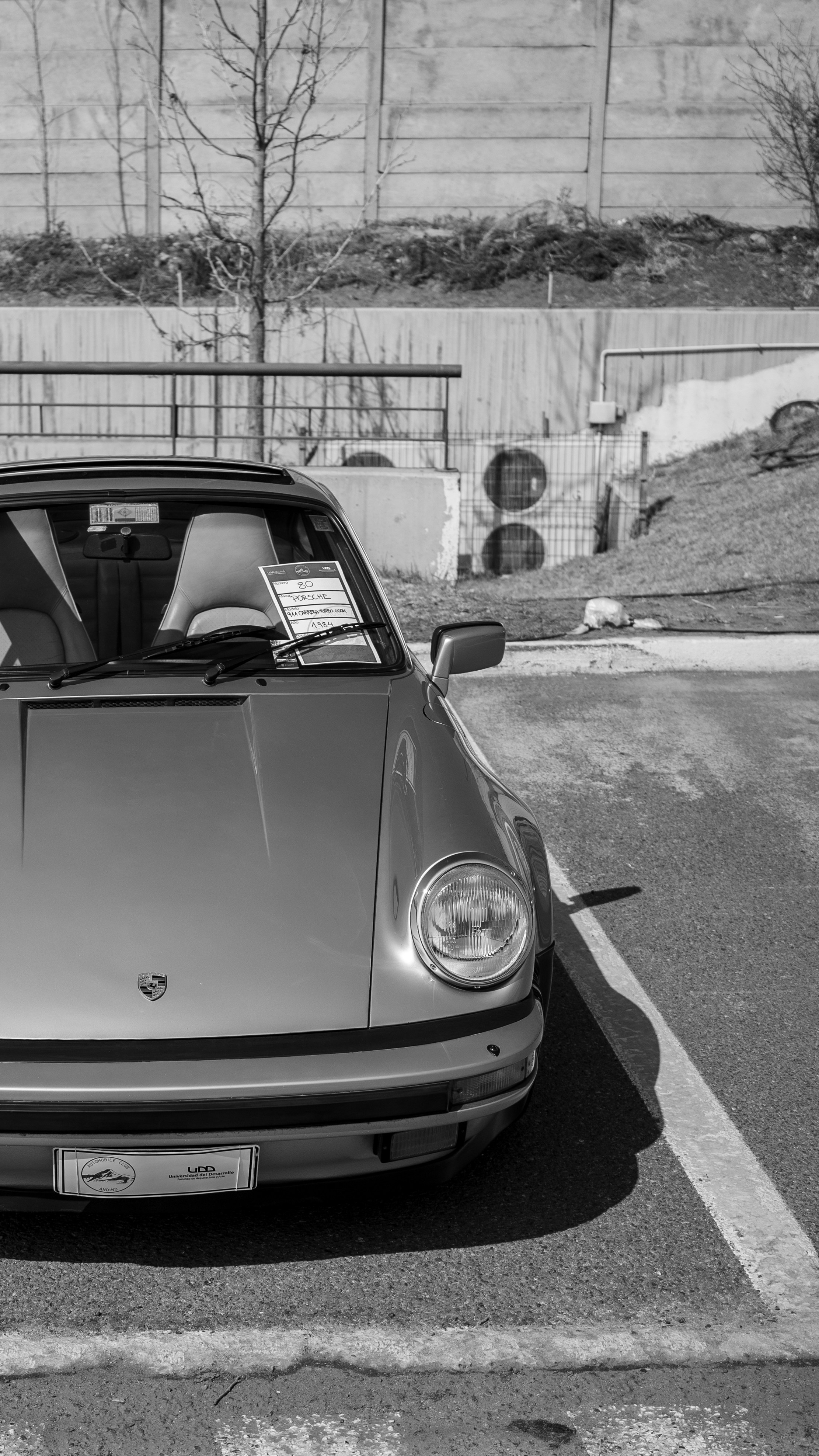 Monochrome Porsche 911: Quiet Power in a Vacant Construction Lot