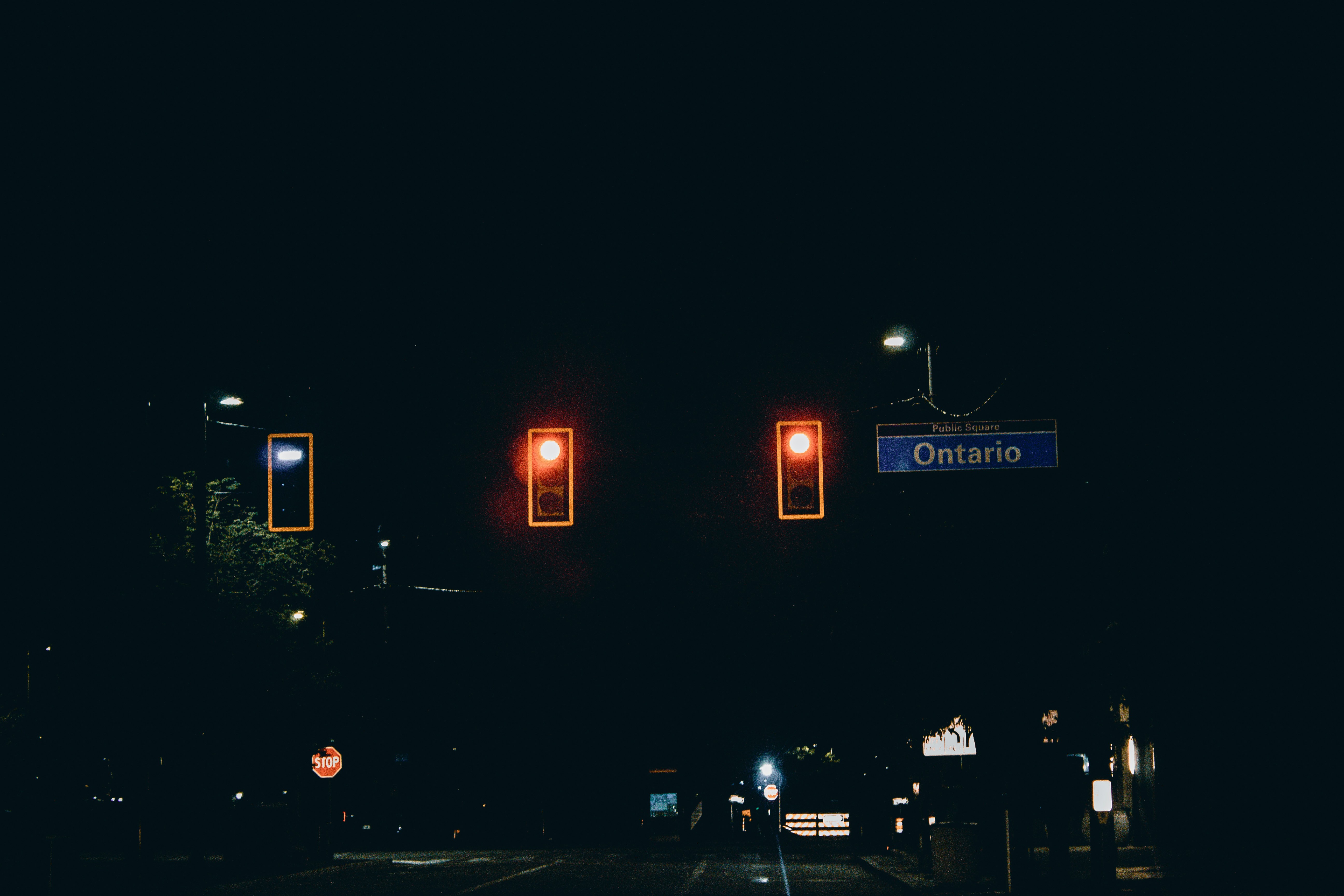Traffic Signals Against a Night Sky