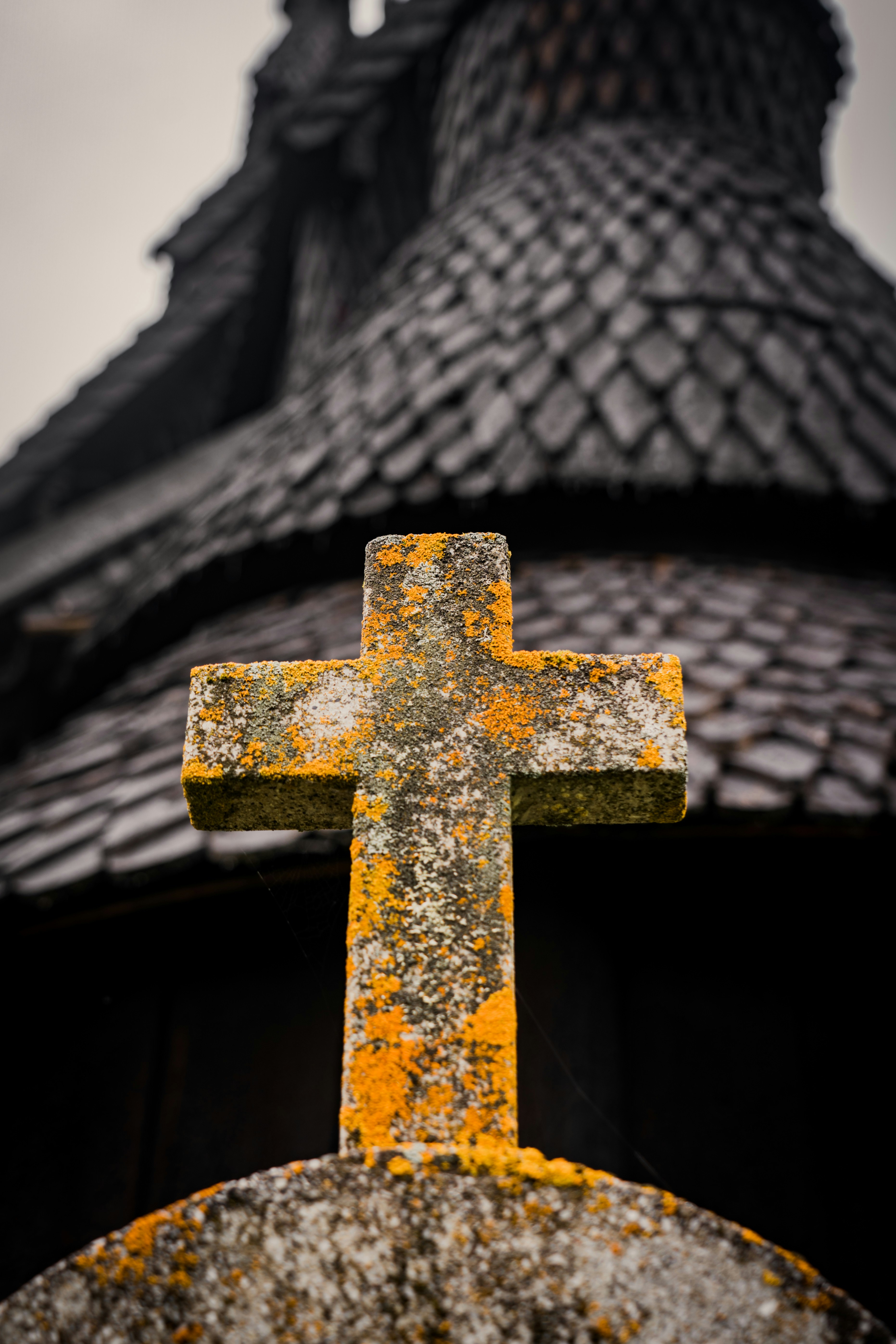 A tombstone at the incredible Borgund Stave church, built from timber around the year 1200 with unique wood joints and wooden nails, and still in incredible condition today.