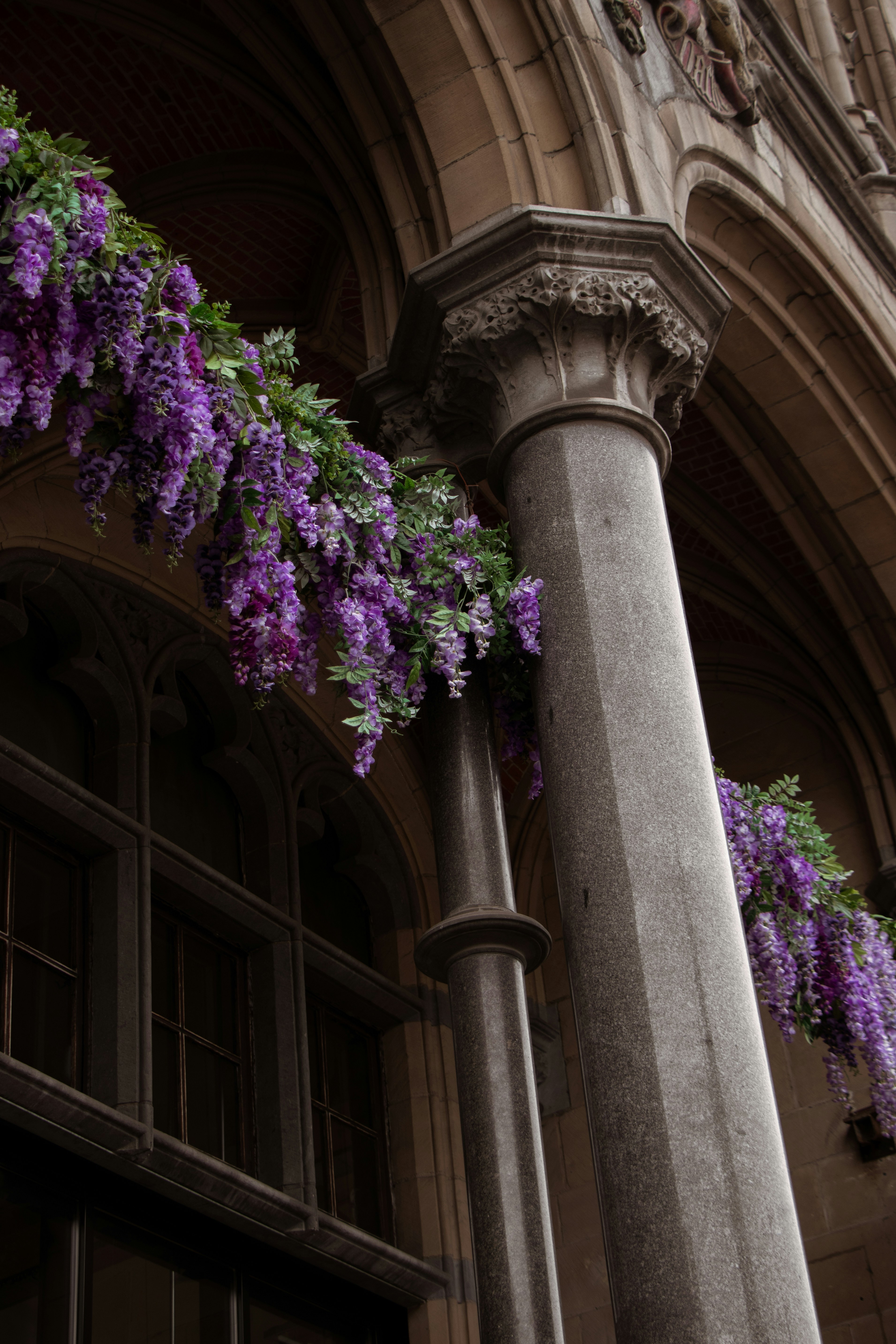 Lilac Cascades on a Stone Portico
