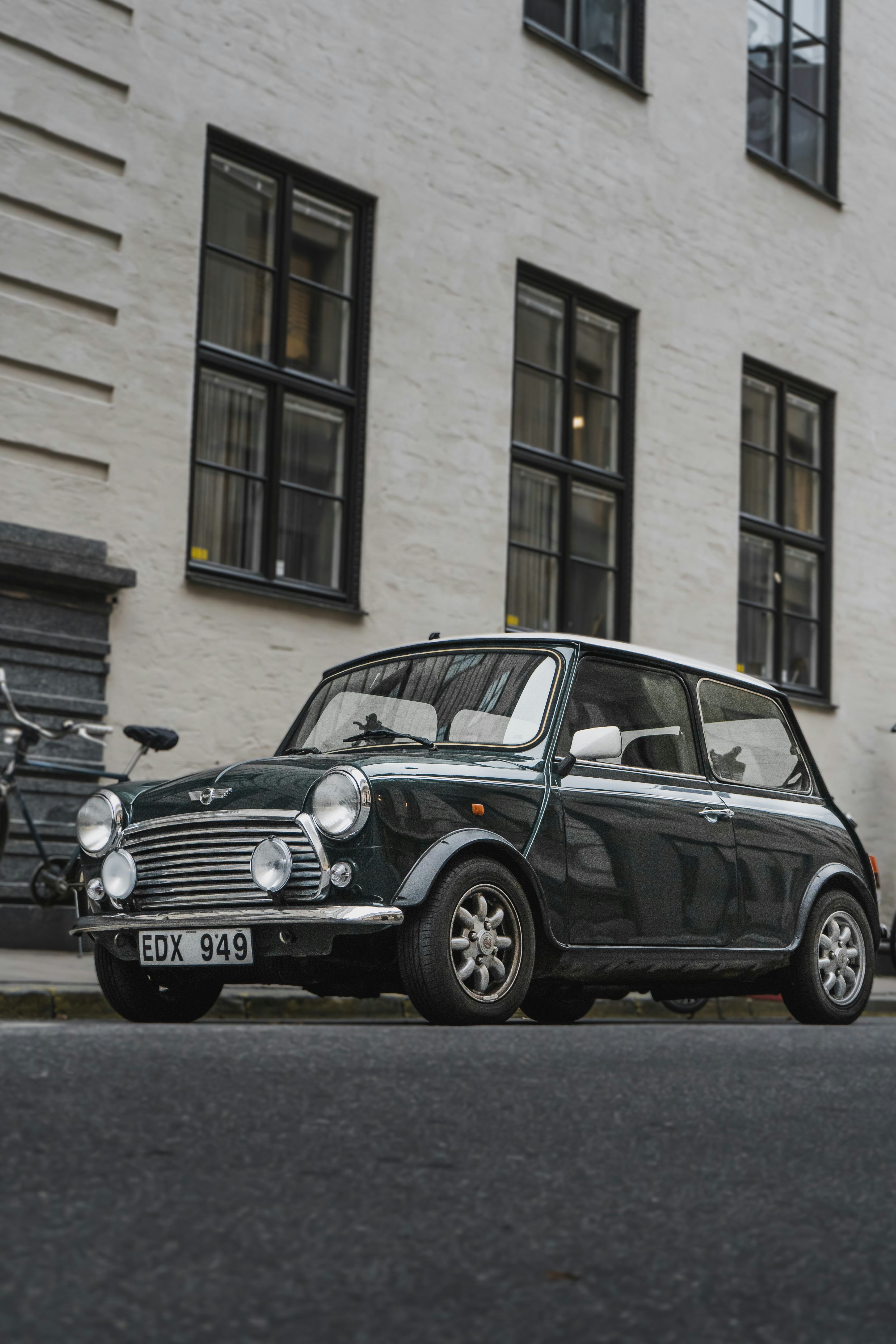 Hey, if you like my photos and want to see more, visit my webpage myrtorp.com - Paypal Support: paypal.me/pmyrtorp - follow me on Instagram: @myrstump - Contact me at Philip@myrtorp.net | a car parked in front of a building