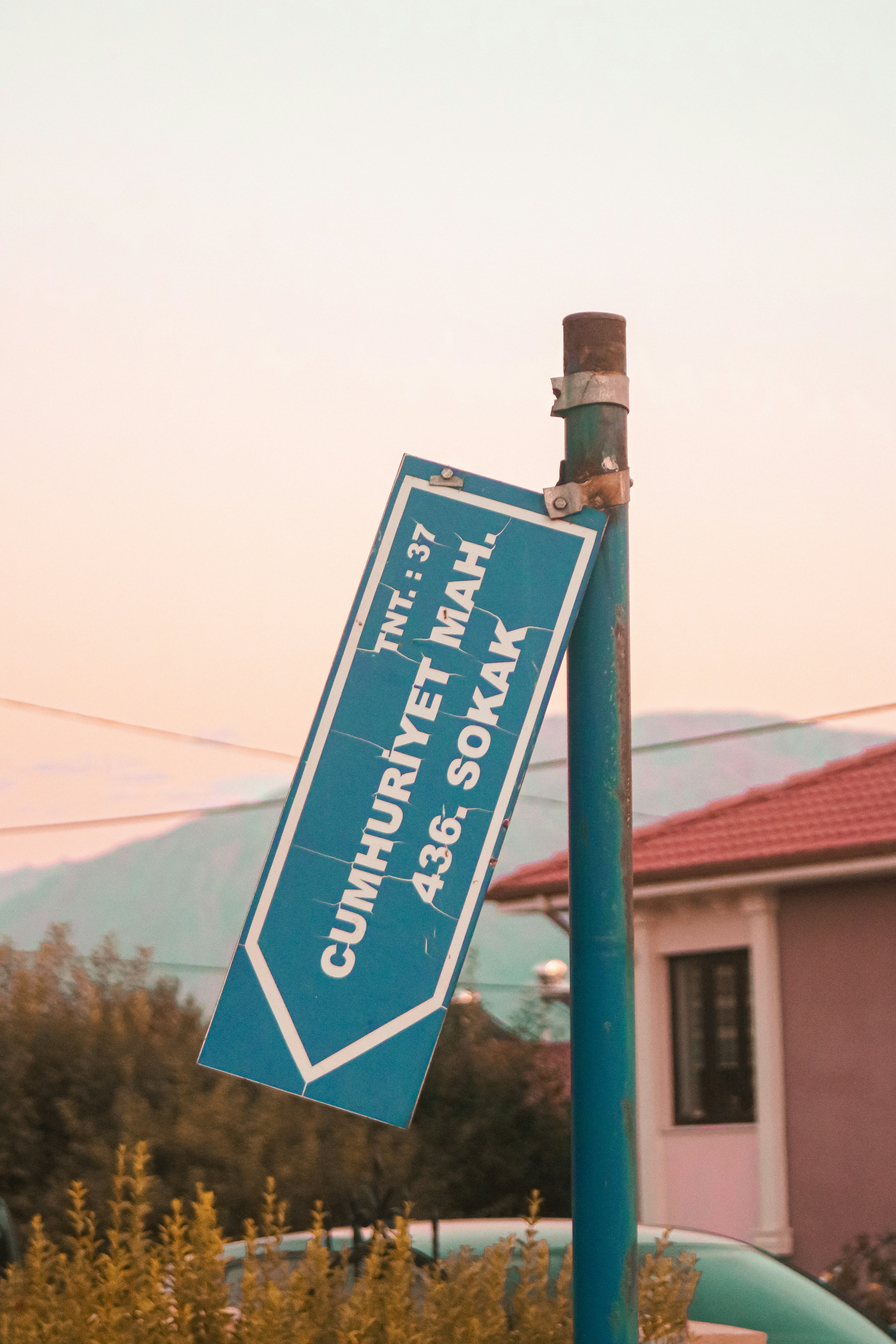broken street sign