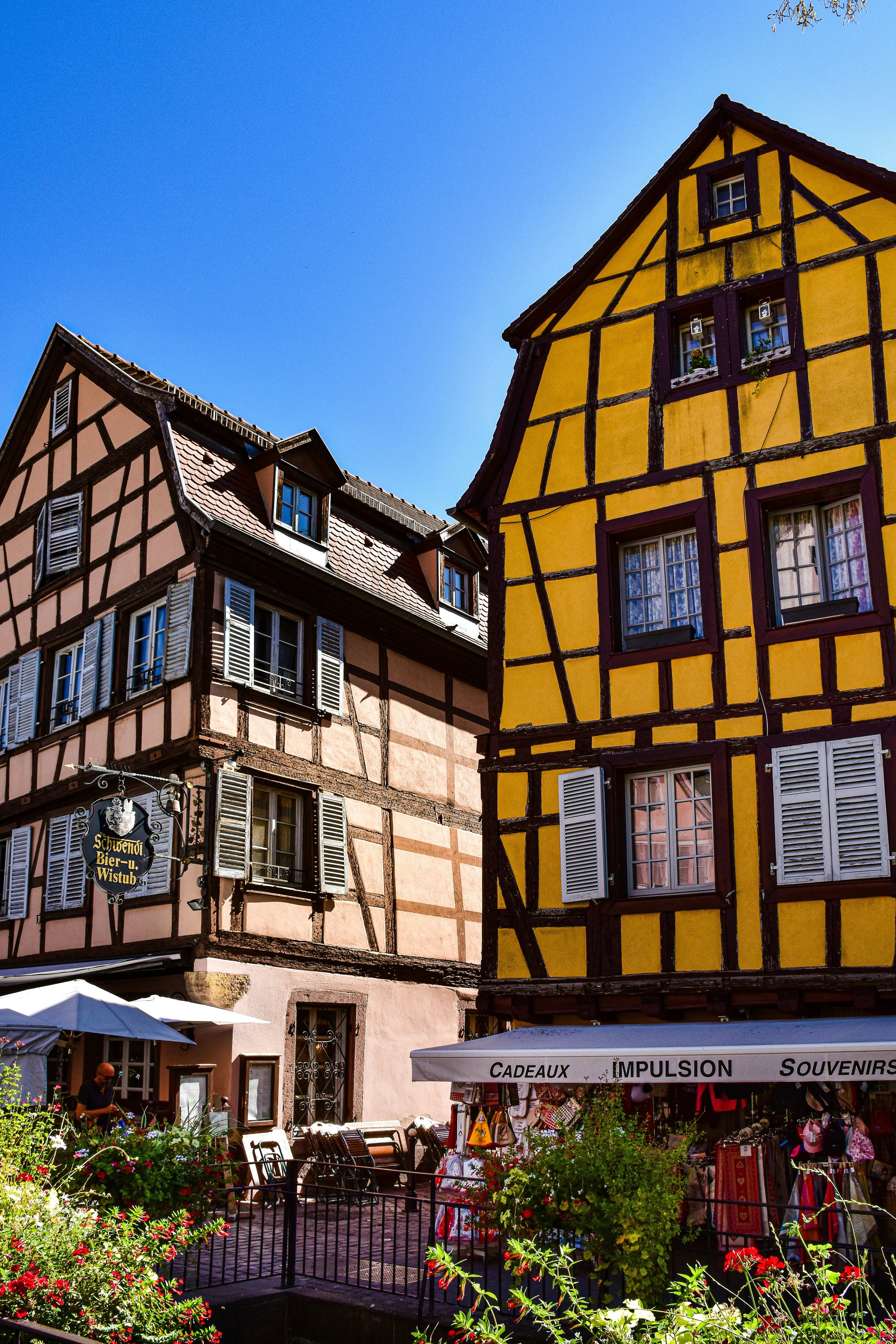 A building with a clock on it photo – Free Alsace Image on Unsplash