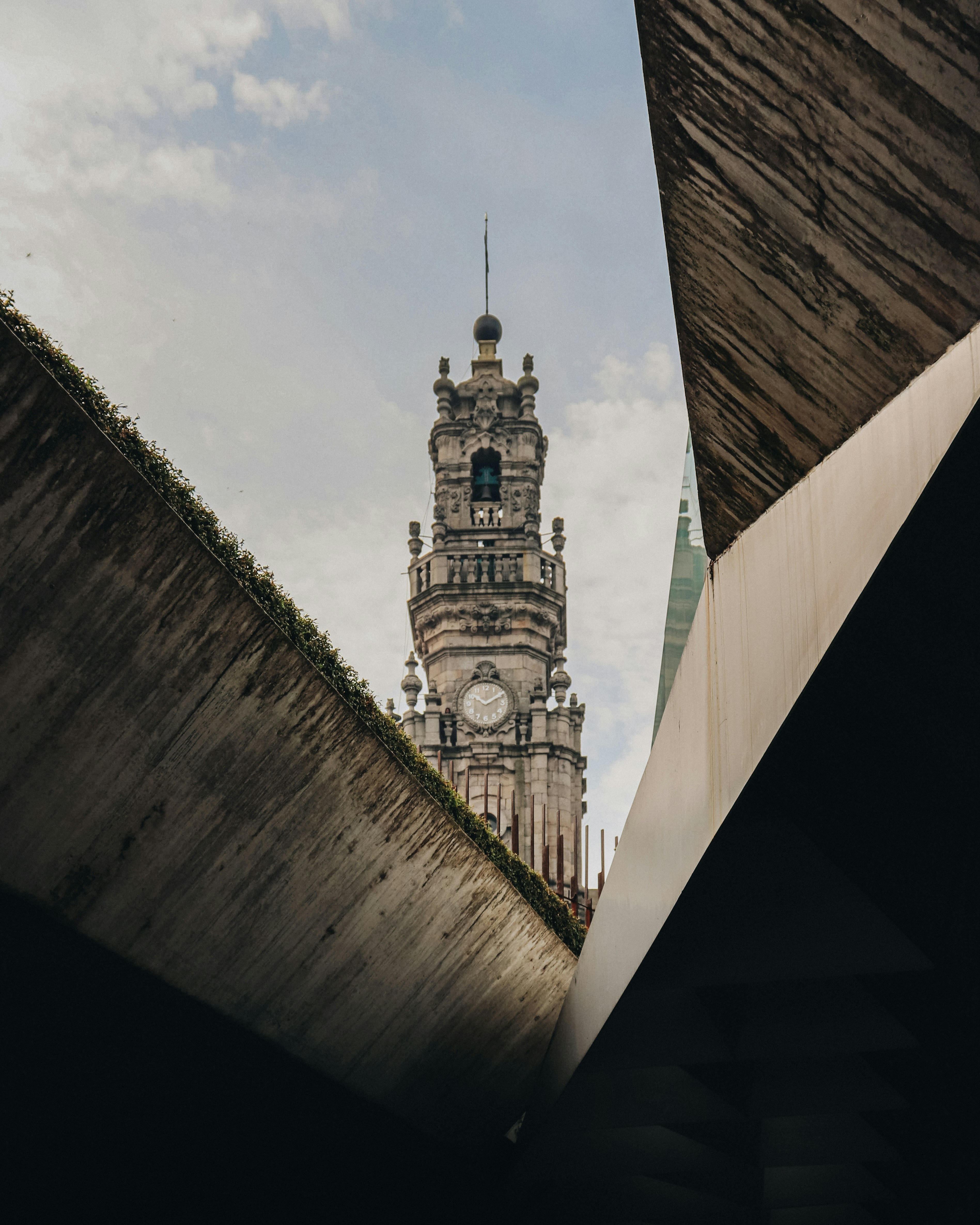 Clocktower Framed by Concrete Angles
