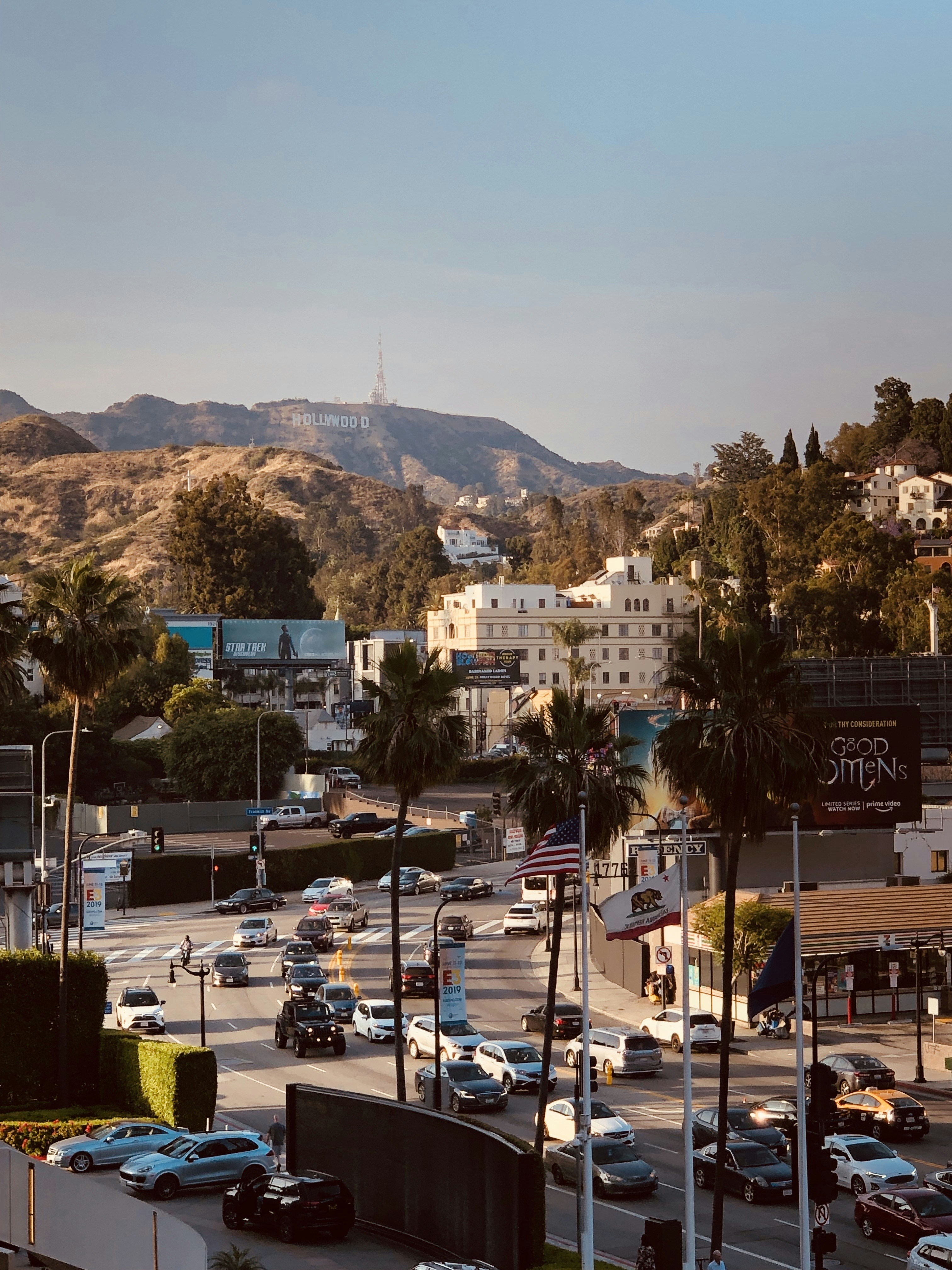 Sunlit Sunset Over Hollywood Hills with Bustling Sunset Strip