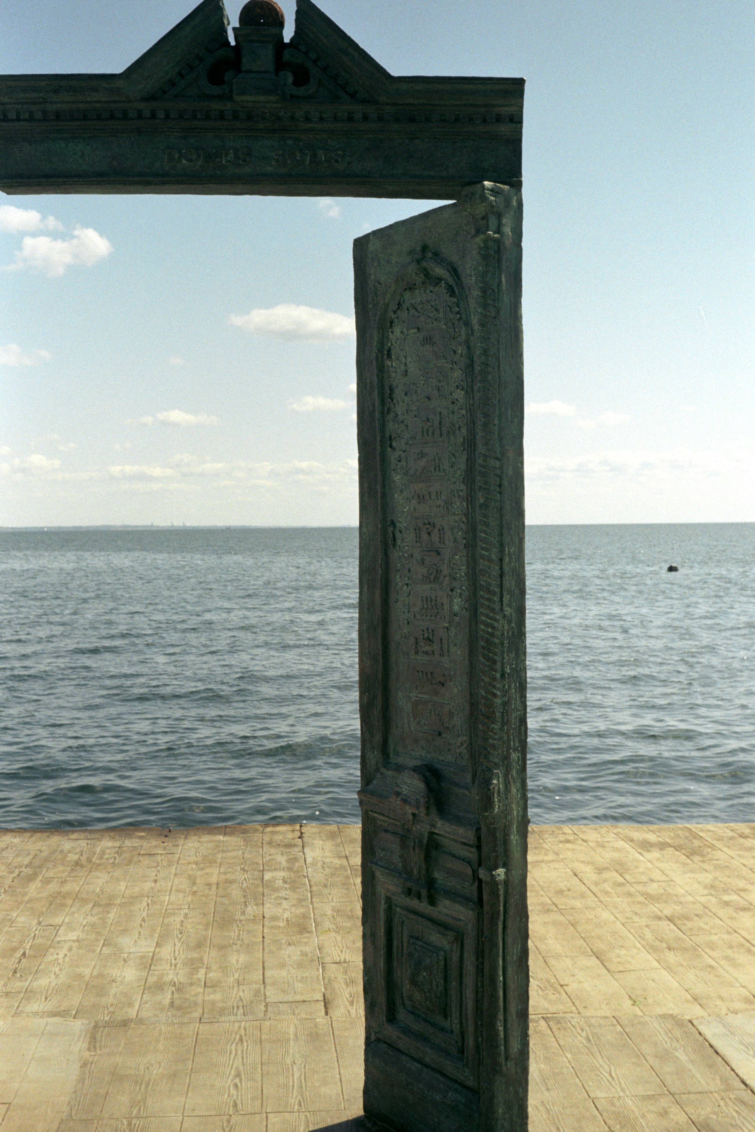 Timeworn Pier Arch Framing the Quiet Sea