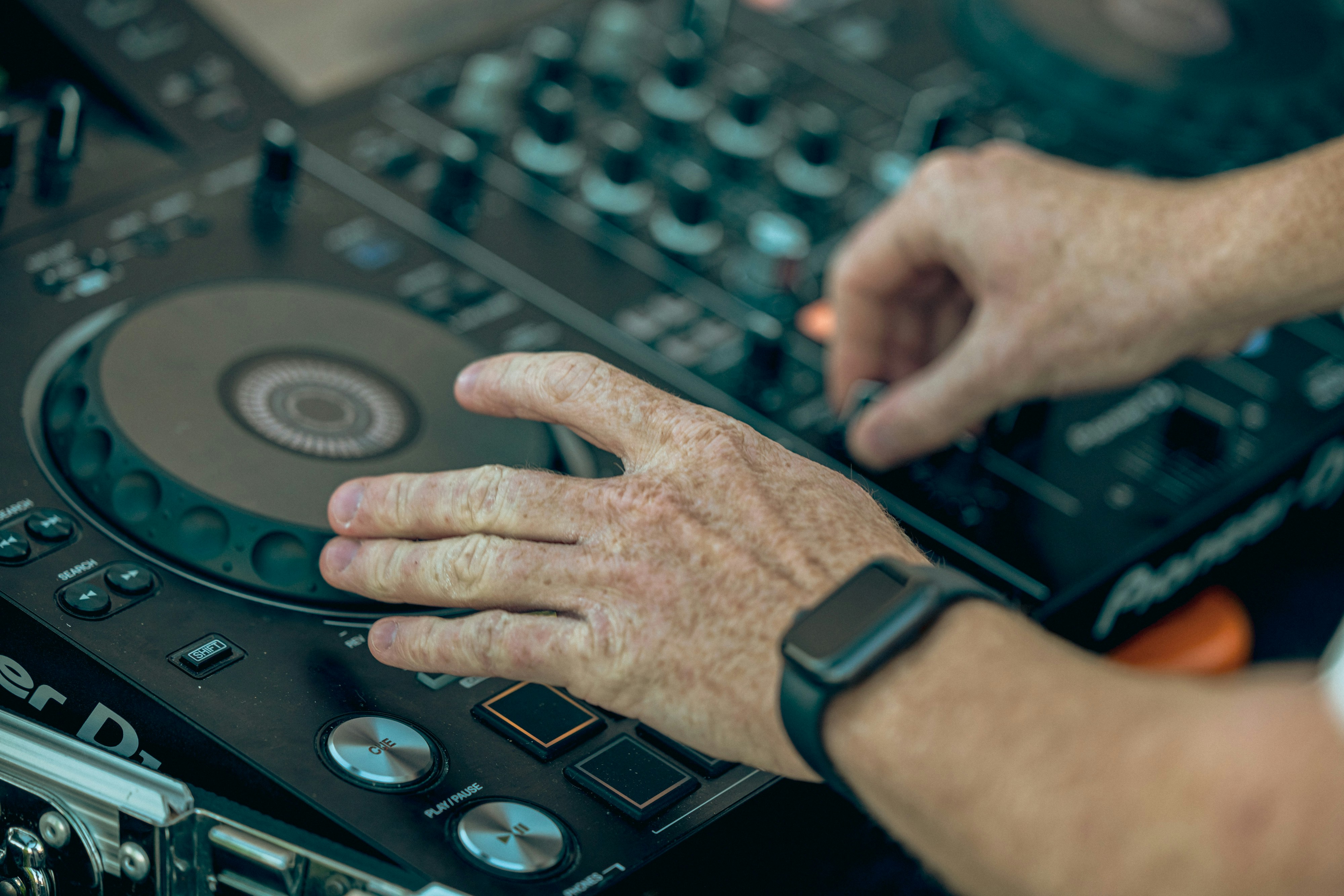 A close-up of hands on a control panel photo – Free Brown Image on Unsplash