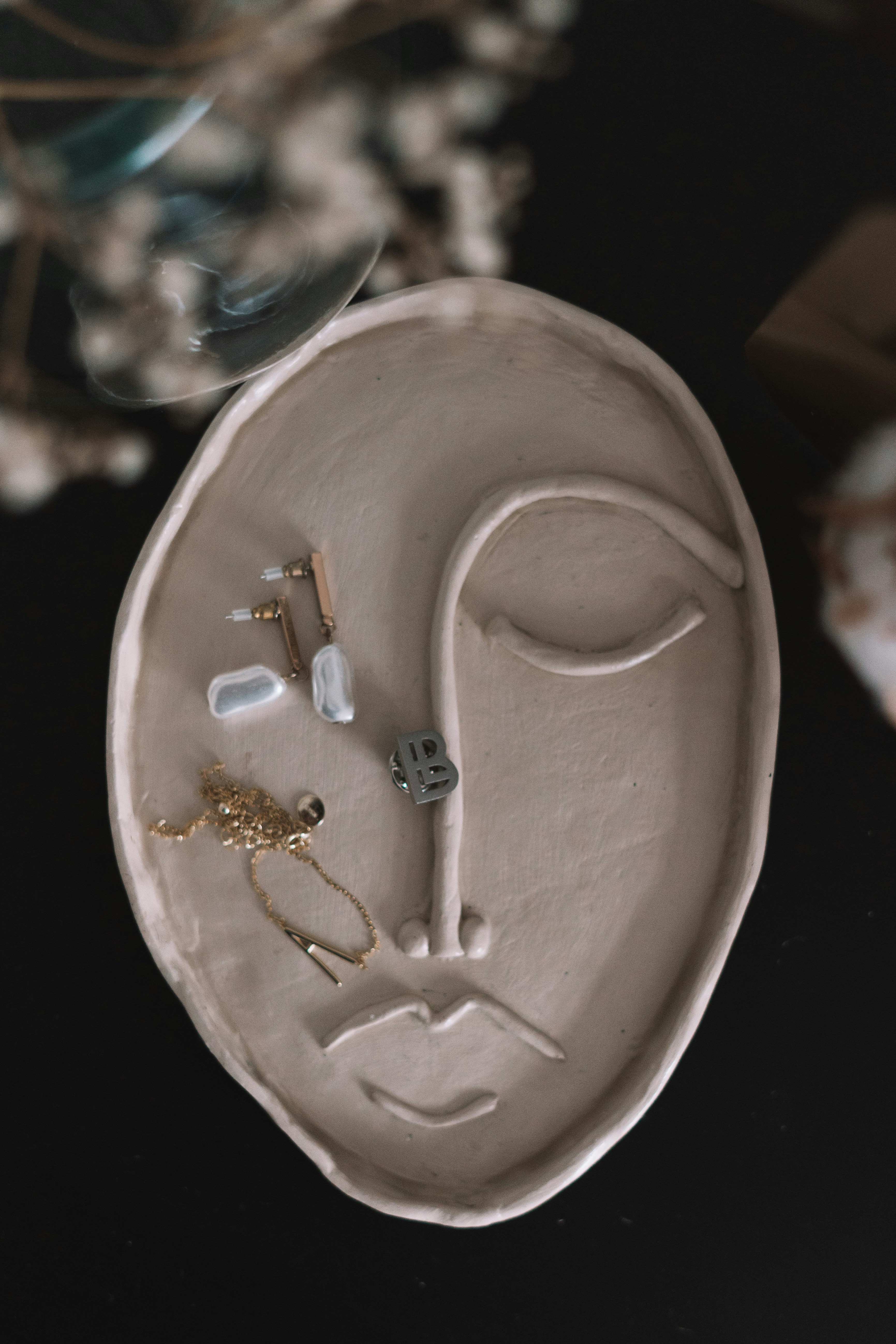 Whispered Adornments on a Ceramic Portrait