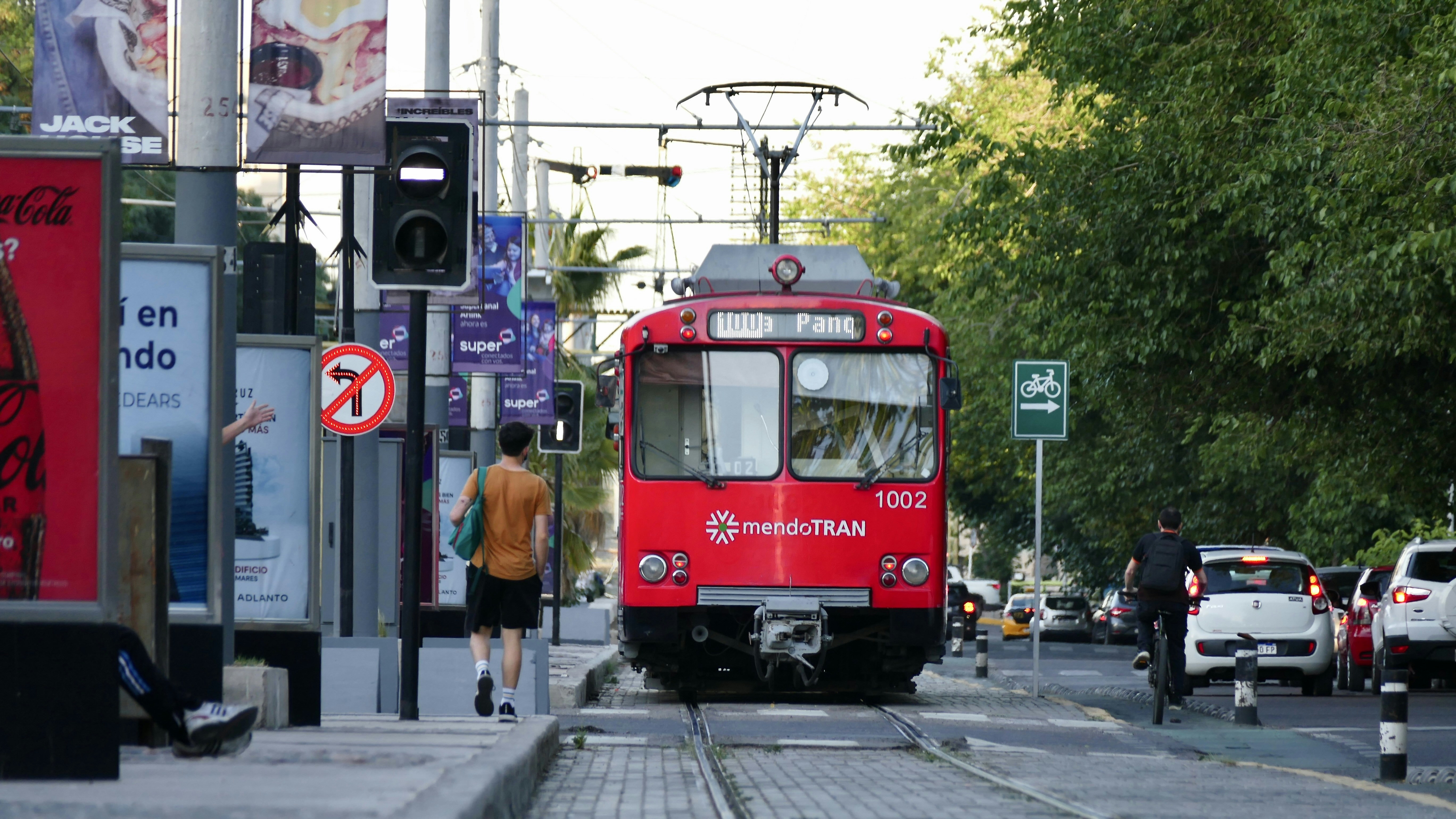 A red trolley on the street photo – Free Mendoza Image on Unsplash