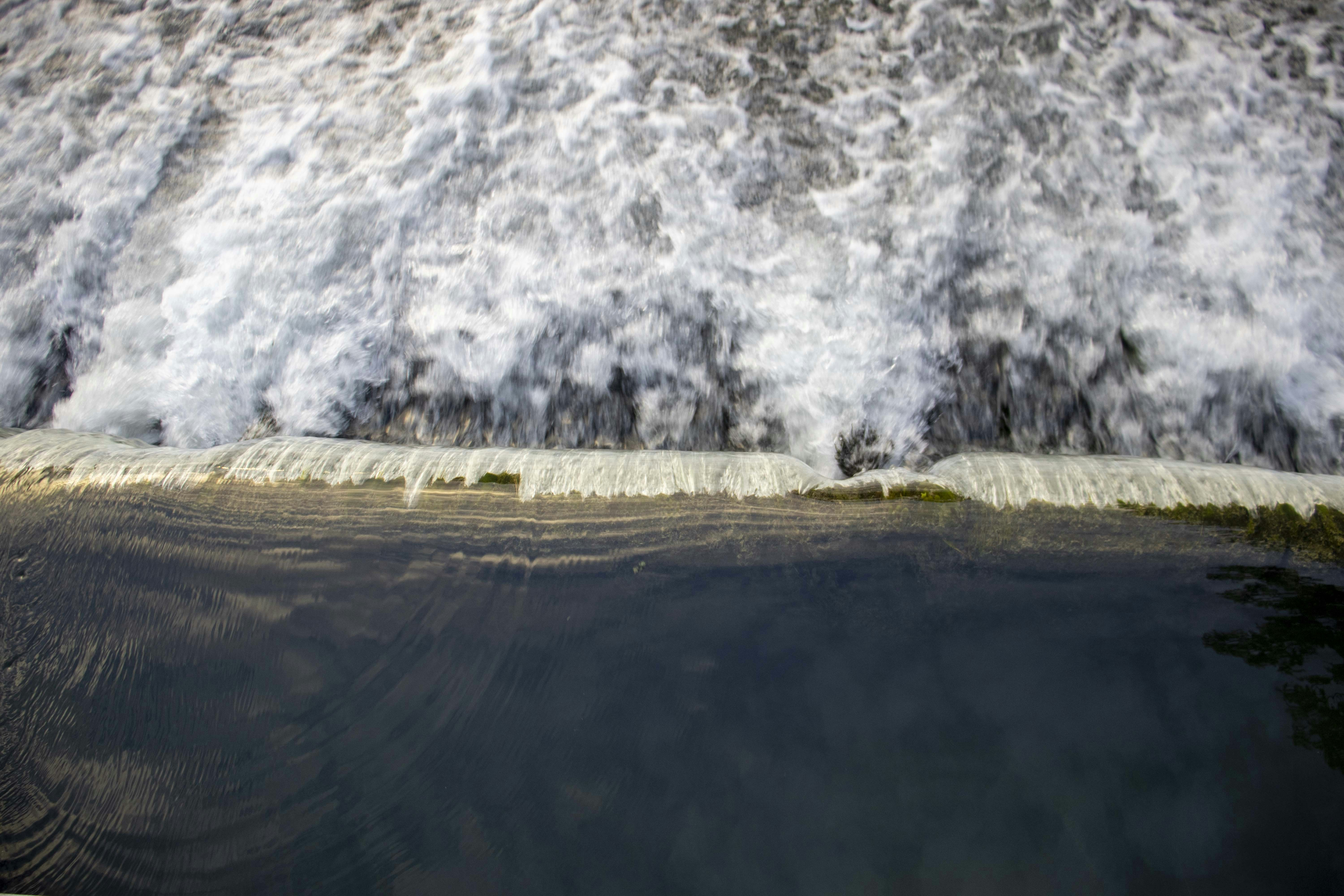 A road with a waterfall photo – Free Nogent-sur-seine Image on Unsplash