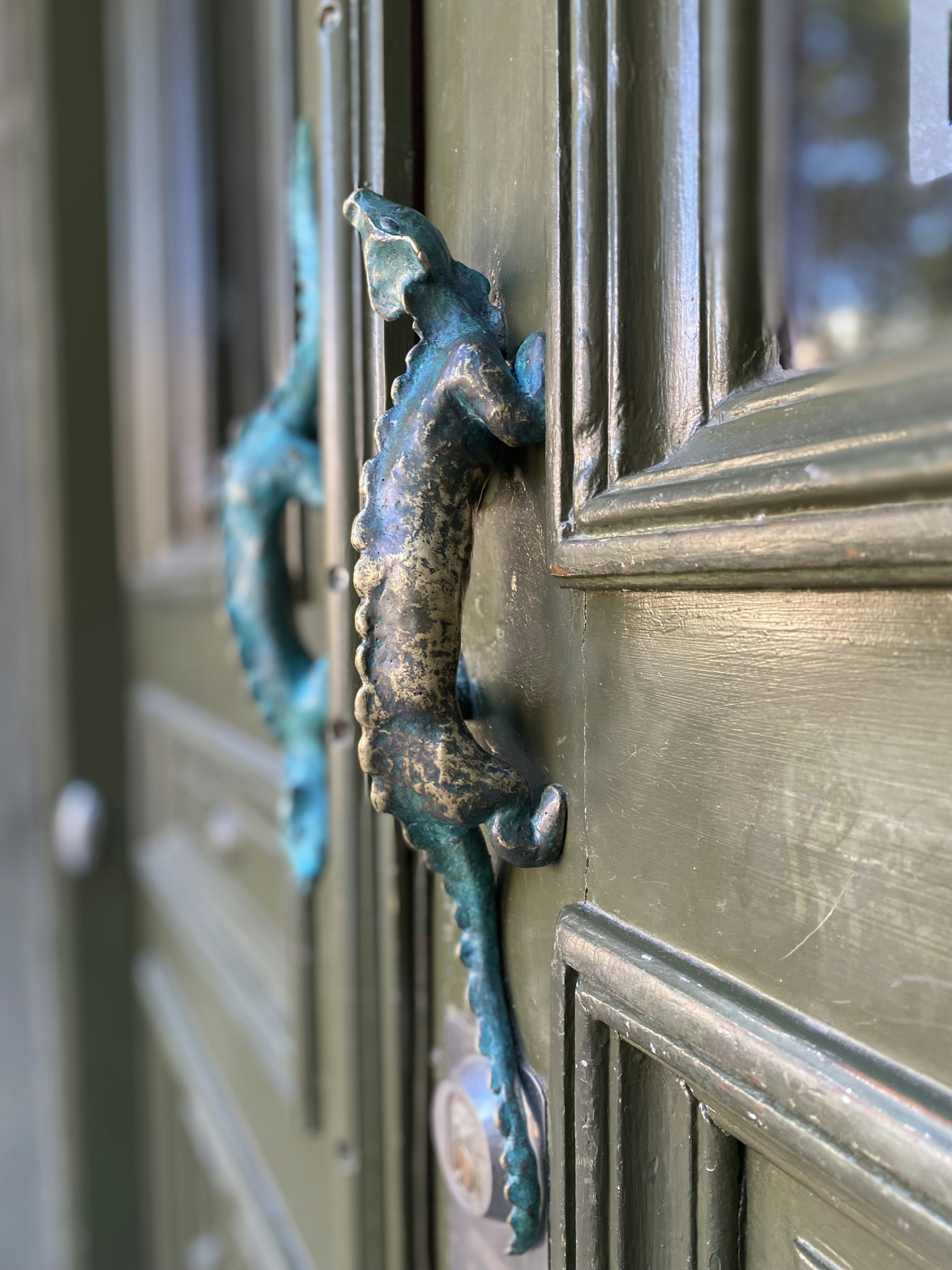 The Tug of Turquoise on an Antique Door Knob