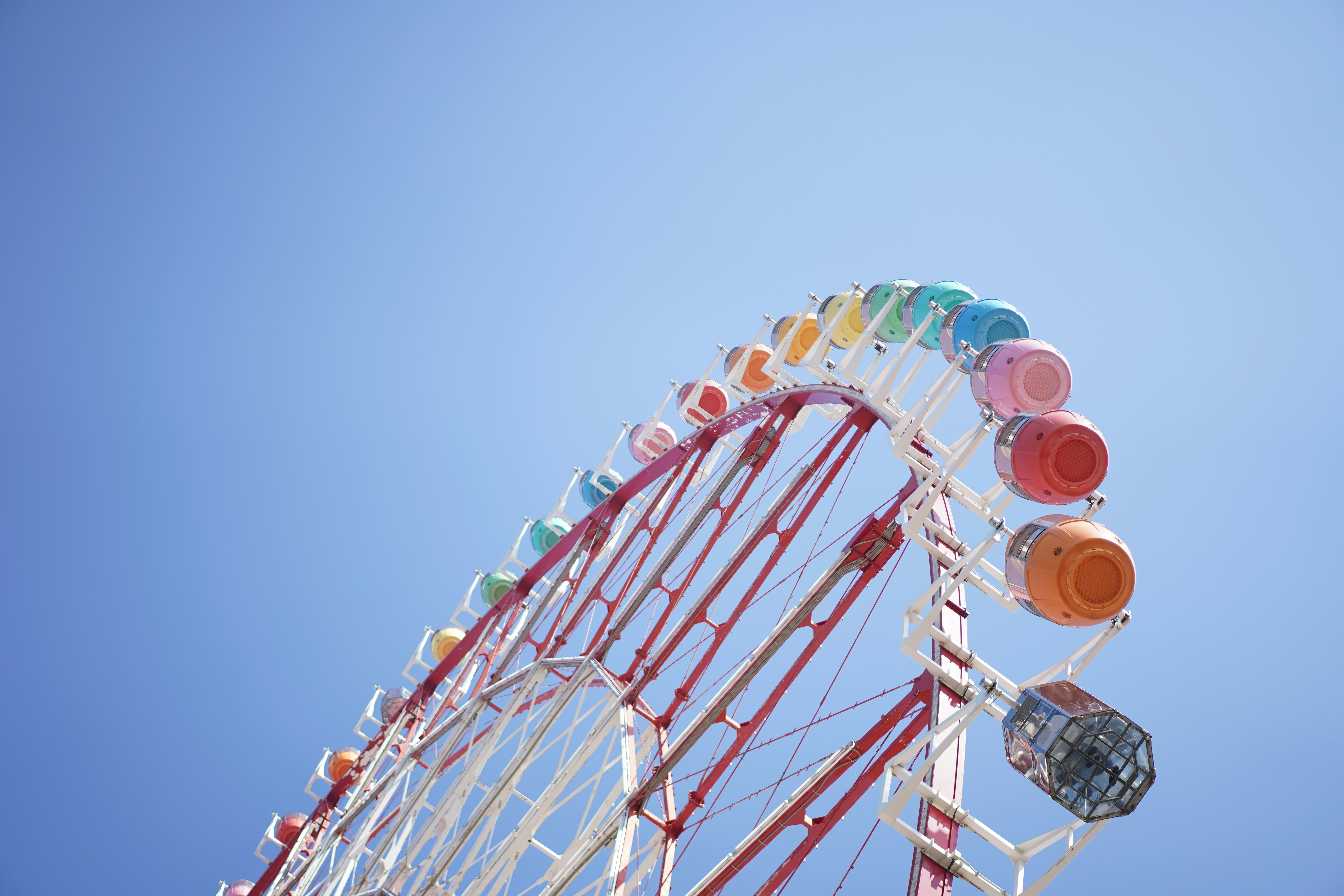 Chromatic Wheel: A Skyward Spin of Colorful Cabs