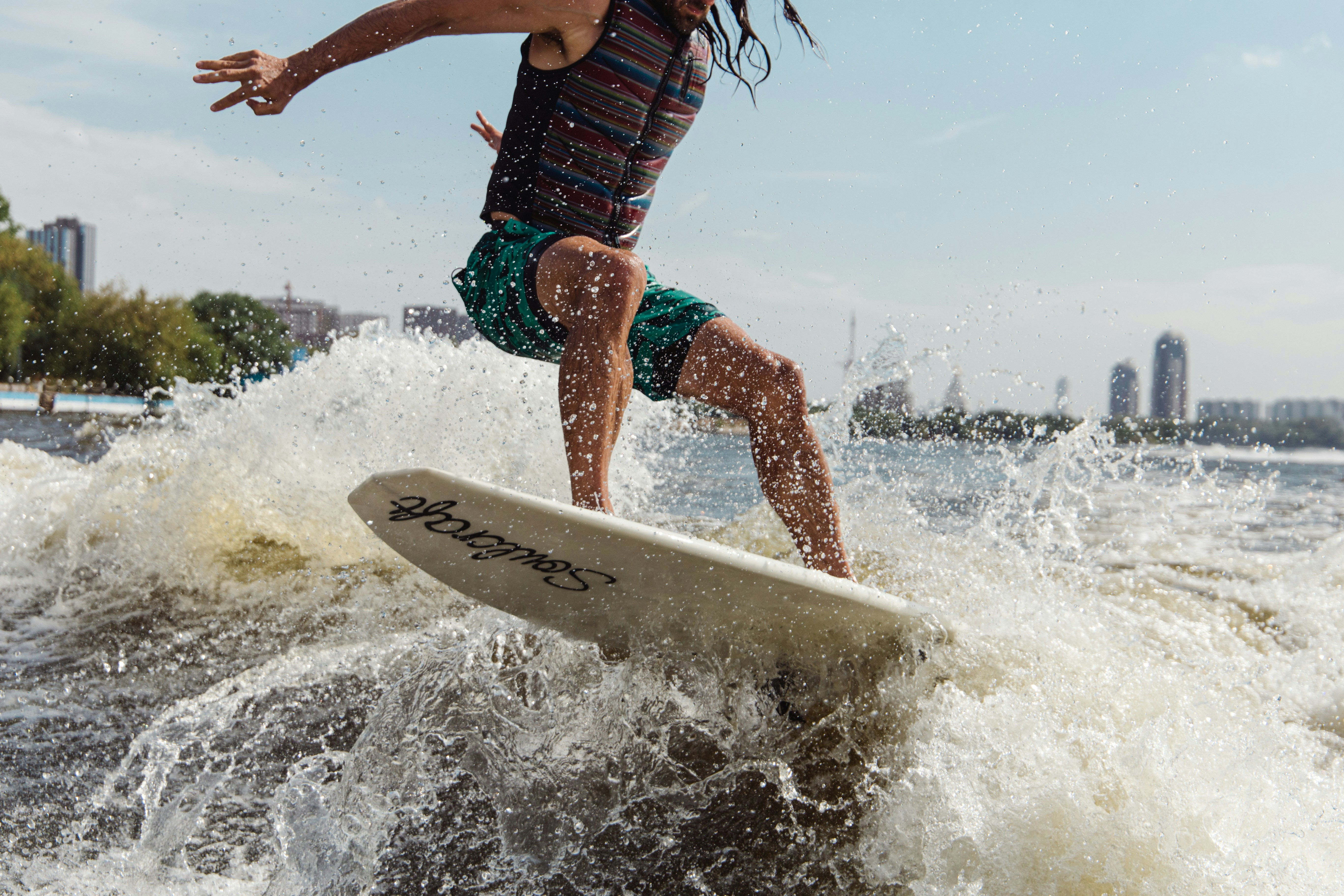A man surfing on the waves photo – Free Nature Image on Unsplash