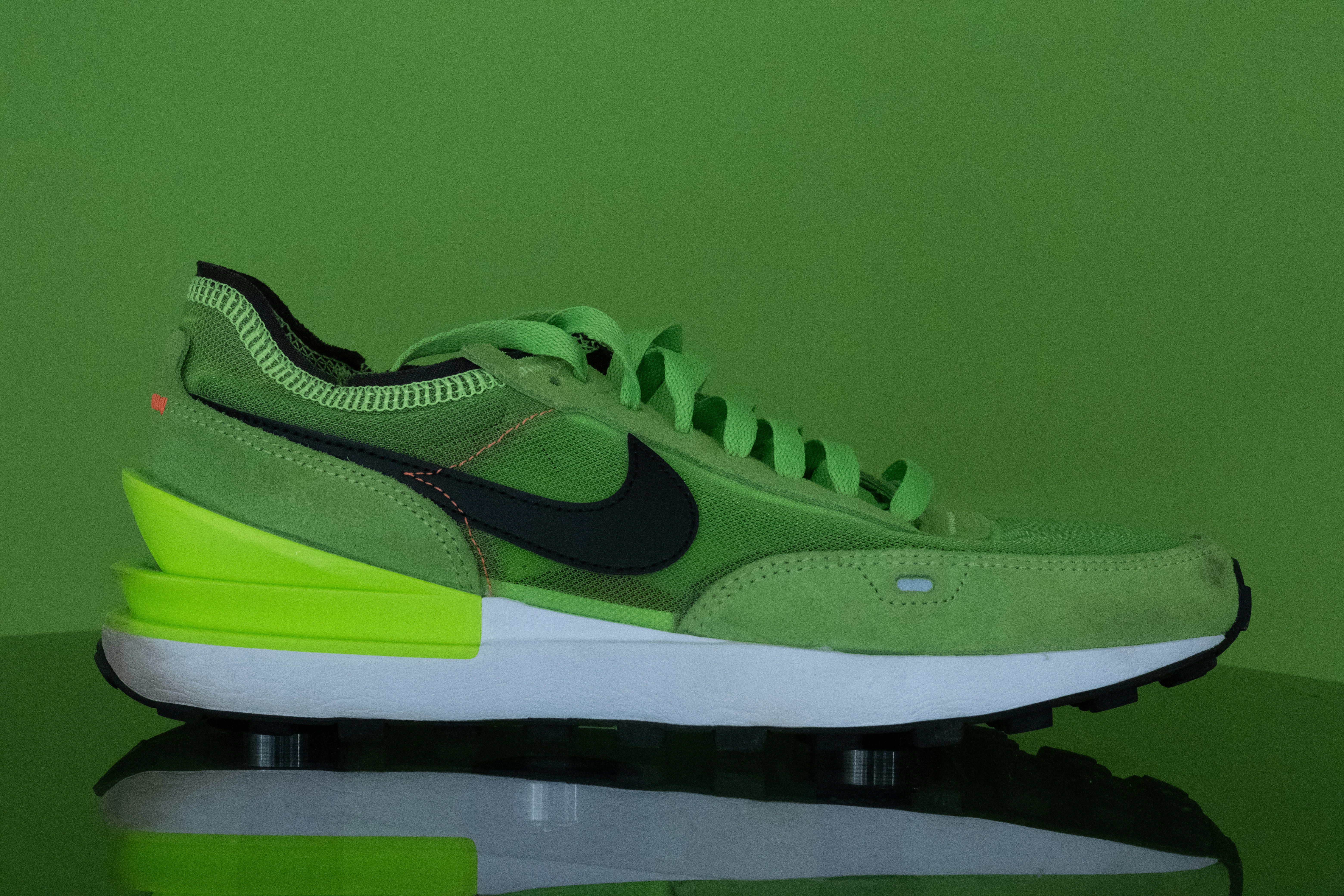 A pair of green shoes photo – Free Sneakers Image on Unsplash