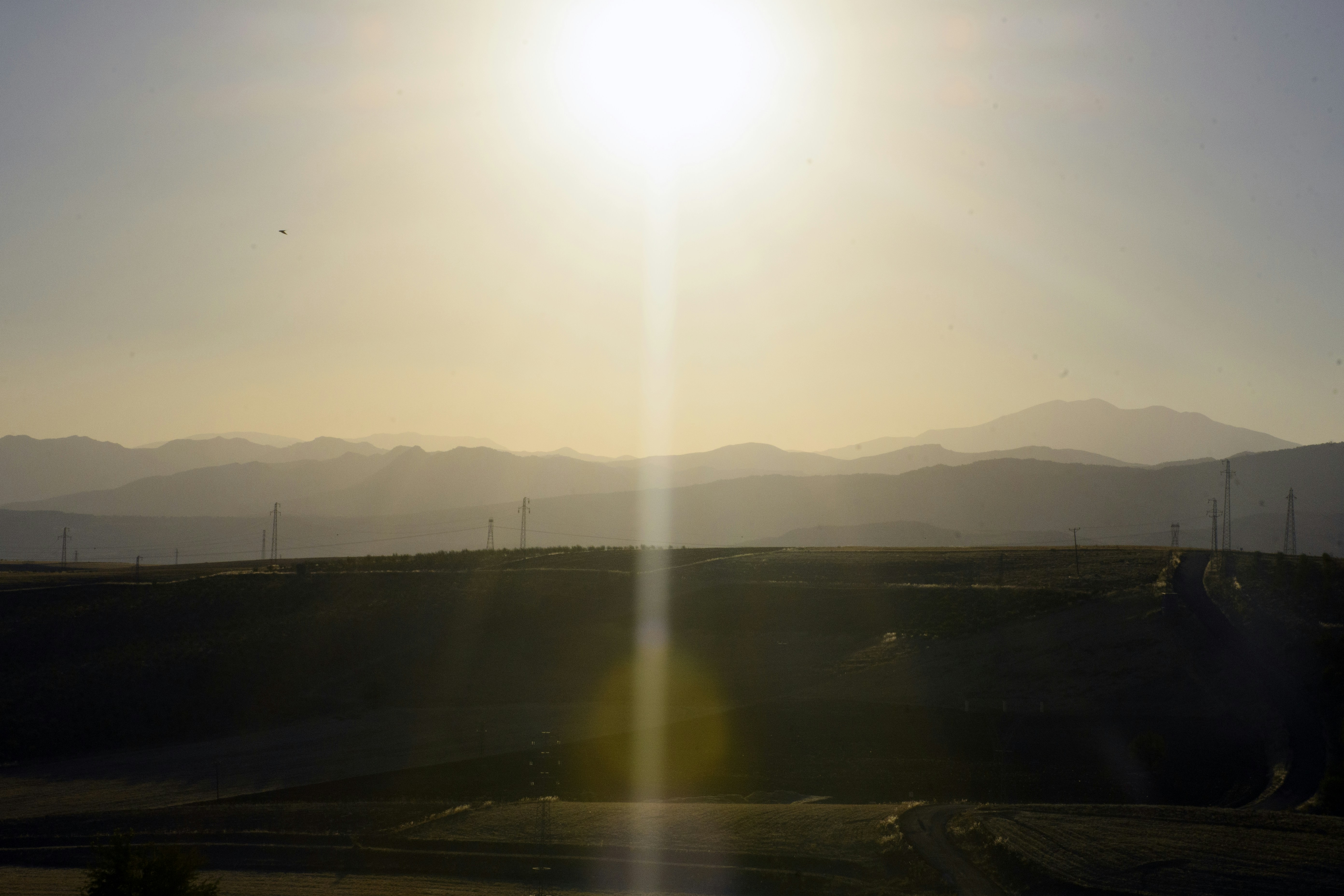 Sunbeam Prism Over the Desert Horizon
