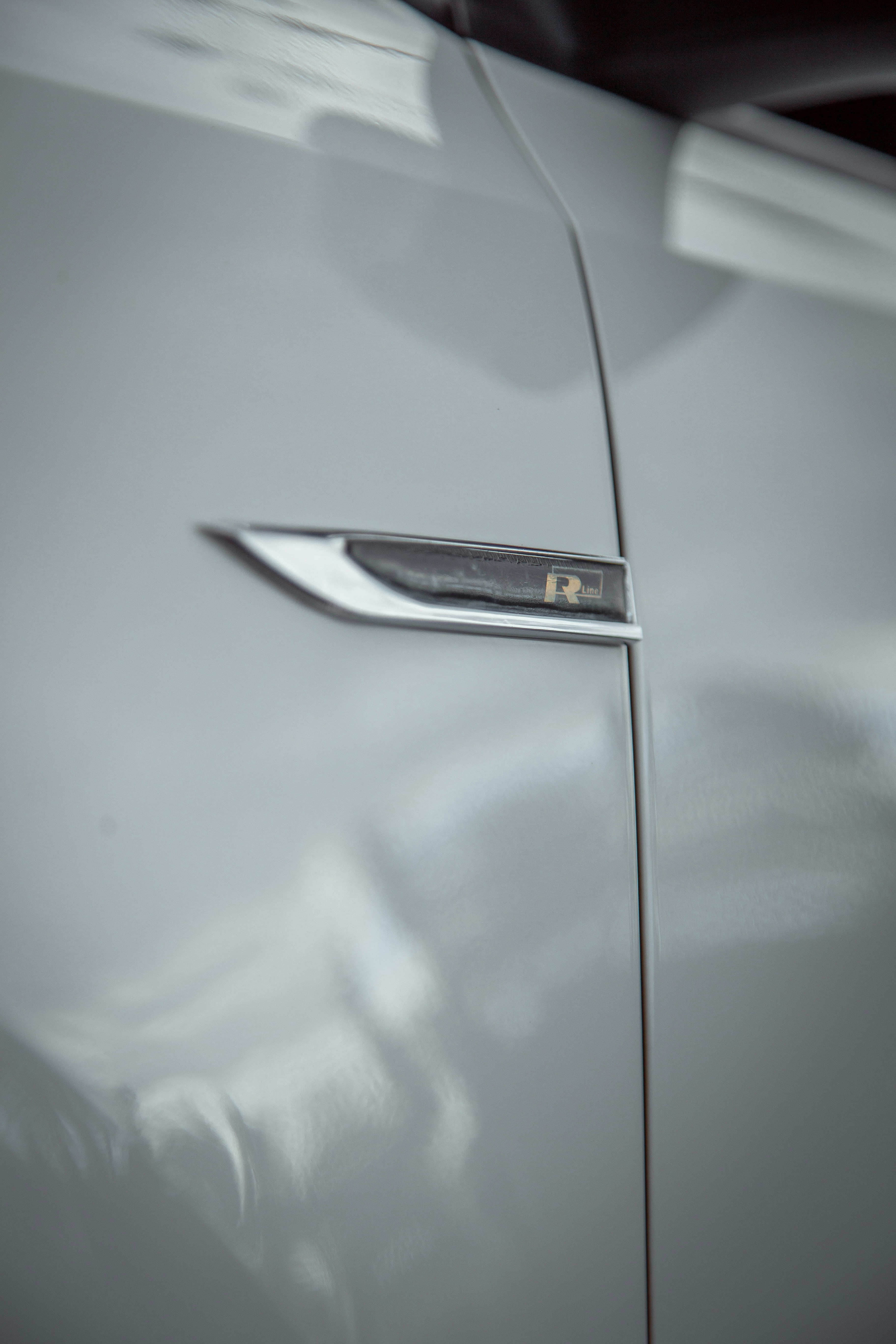 A close up of a car logo photo – Free Grey Image on Unsplash