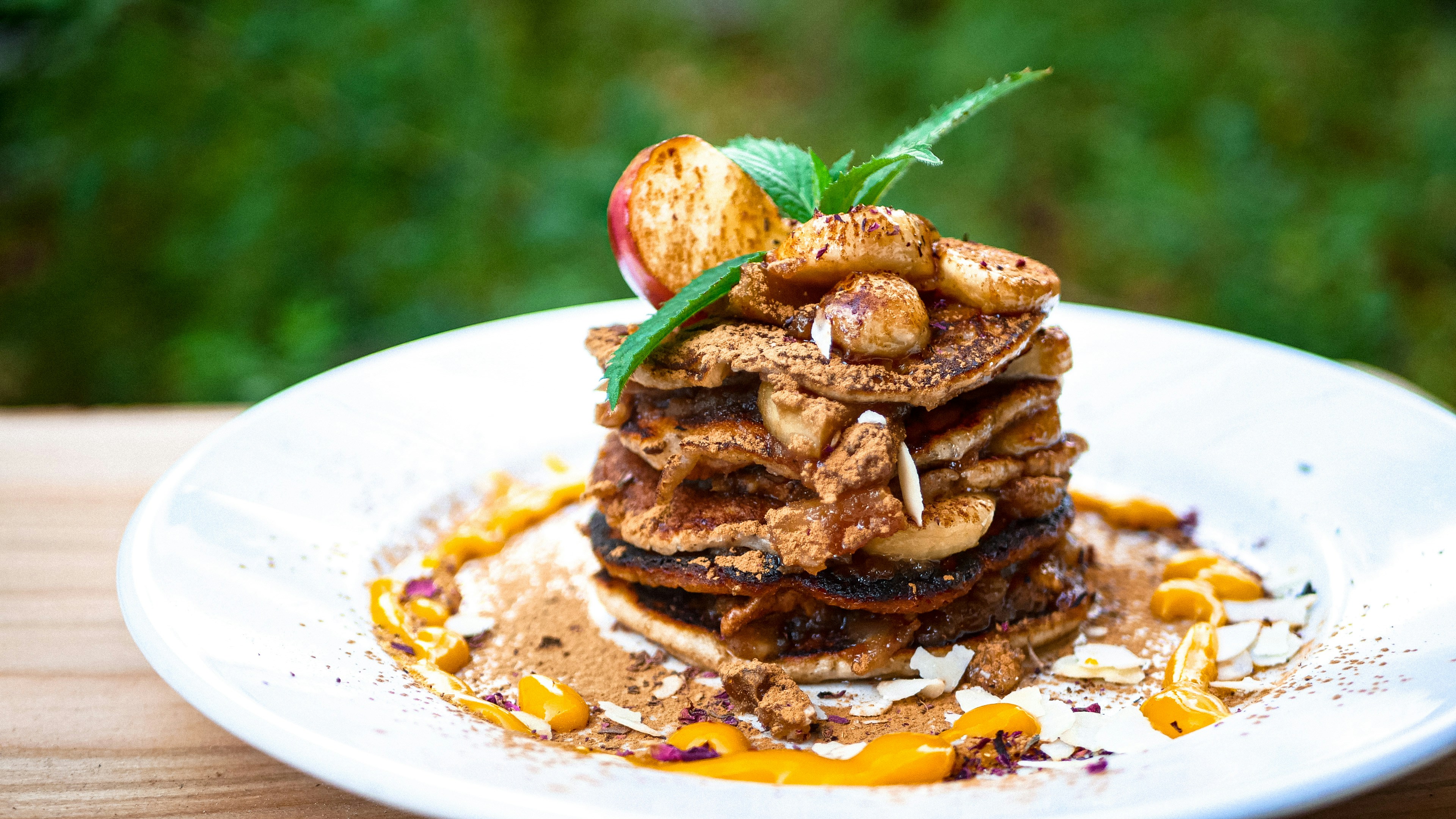 Stacked Chocolate Confection on a Golden Ring of Sauce