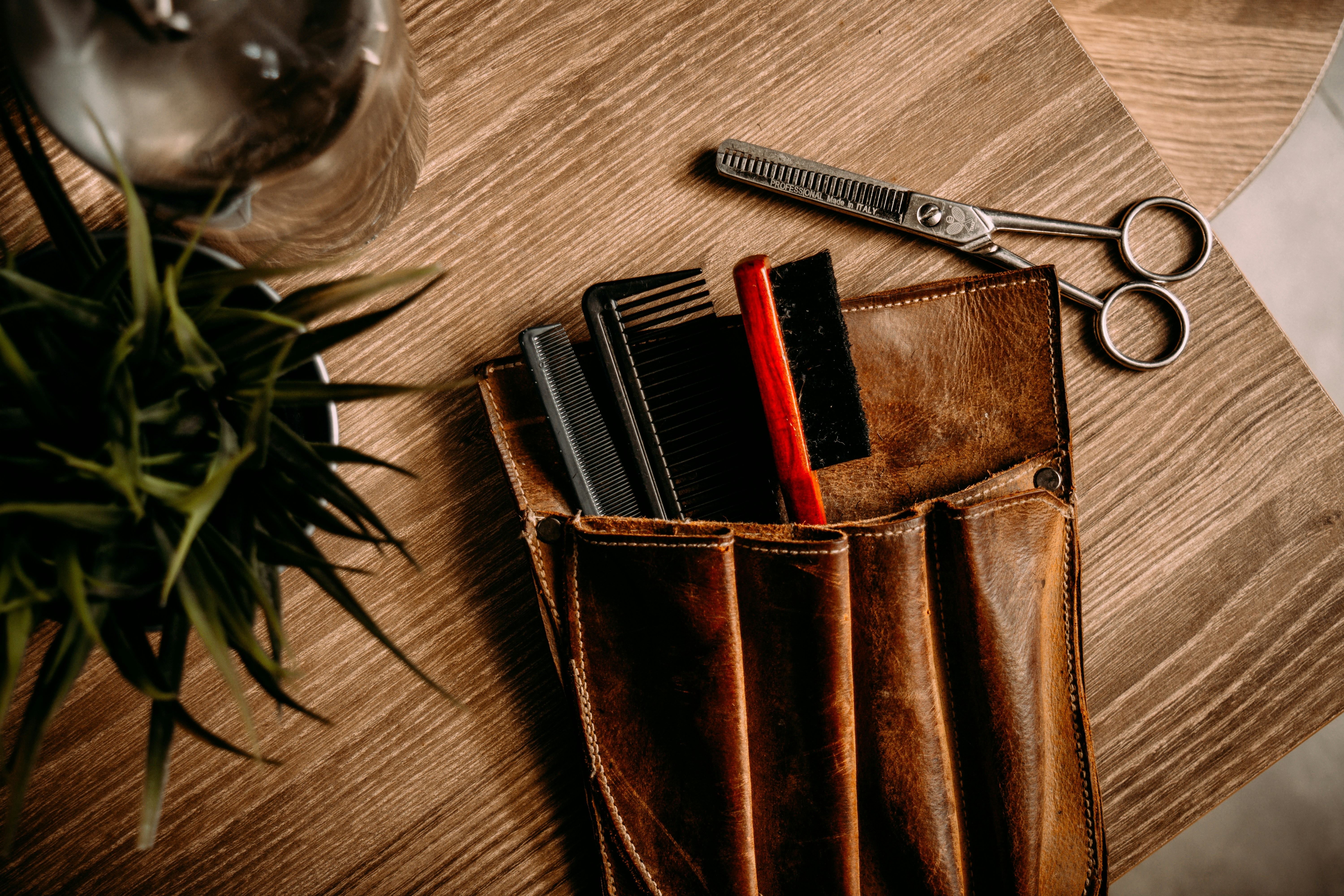 Red Ink in a Weathered Wallet: A Quiet Desk Still Life
