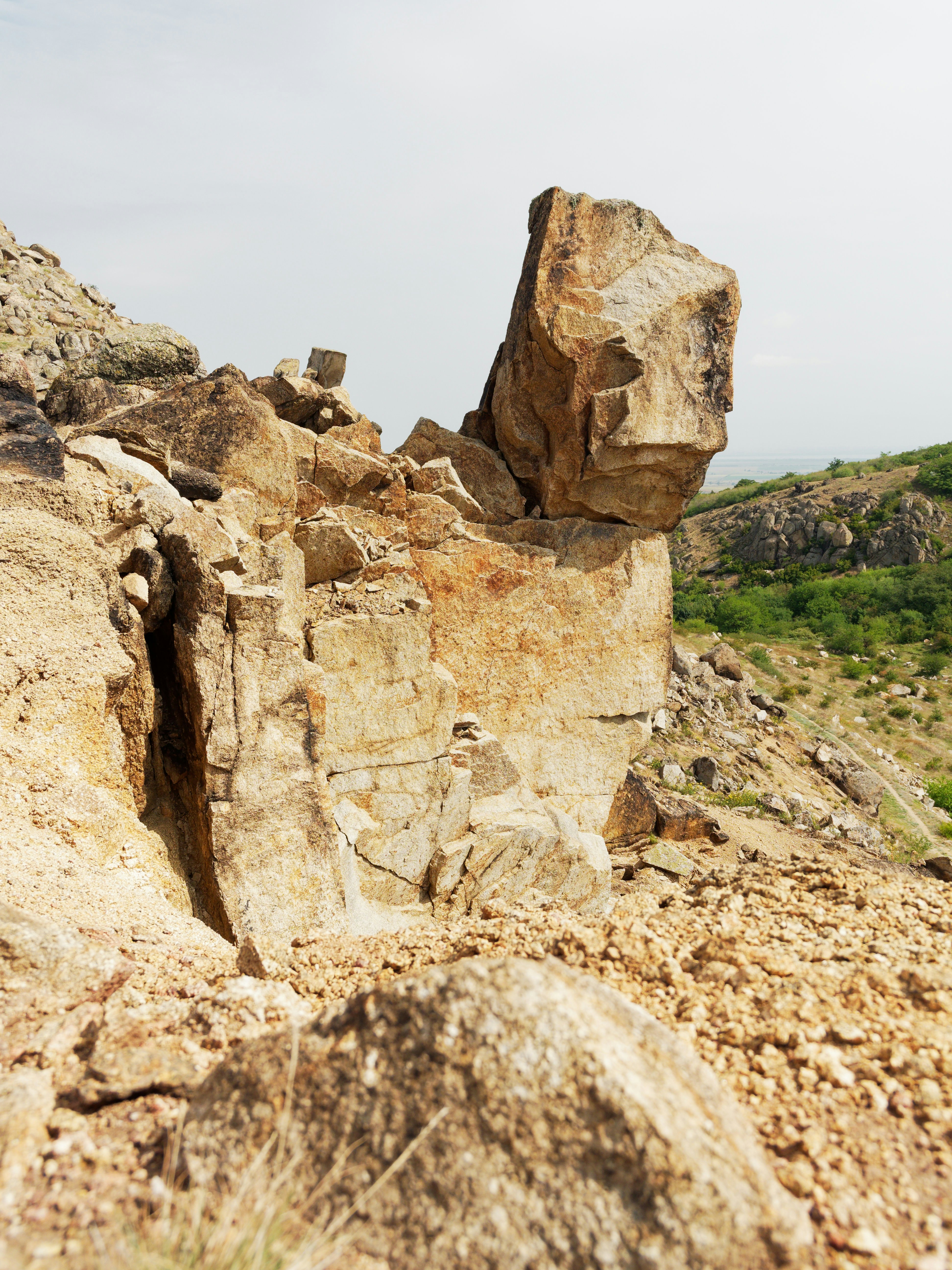 a rock structure with a hole in it