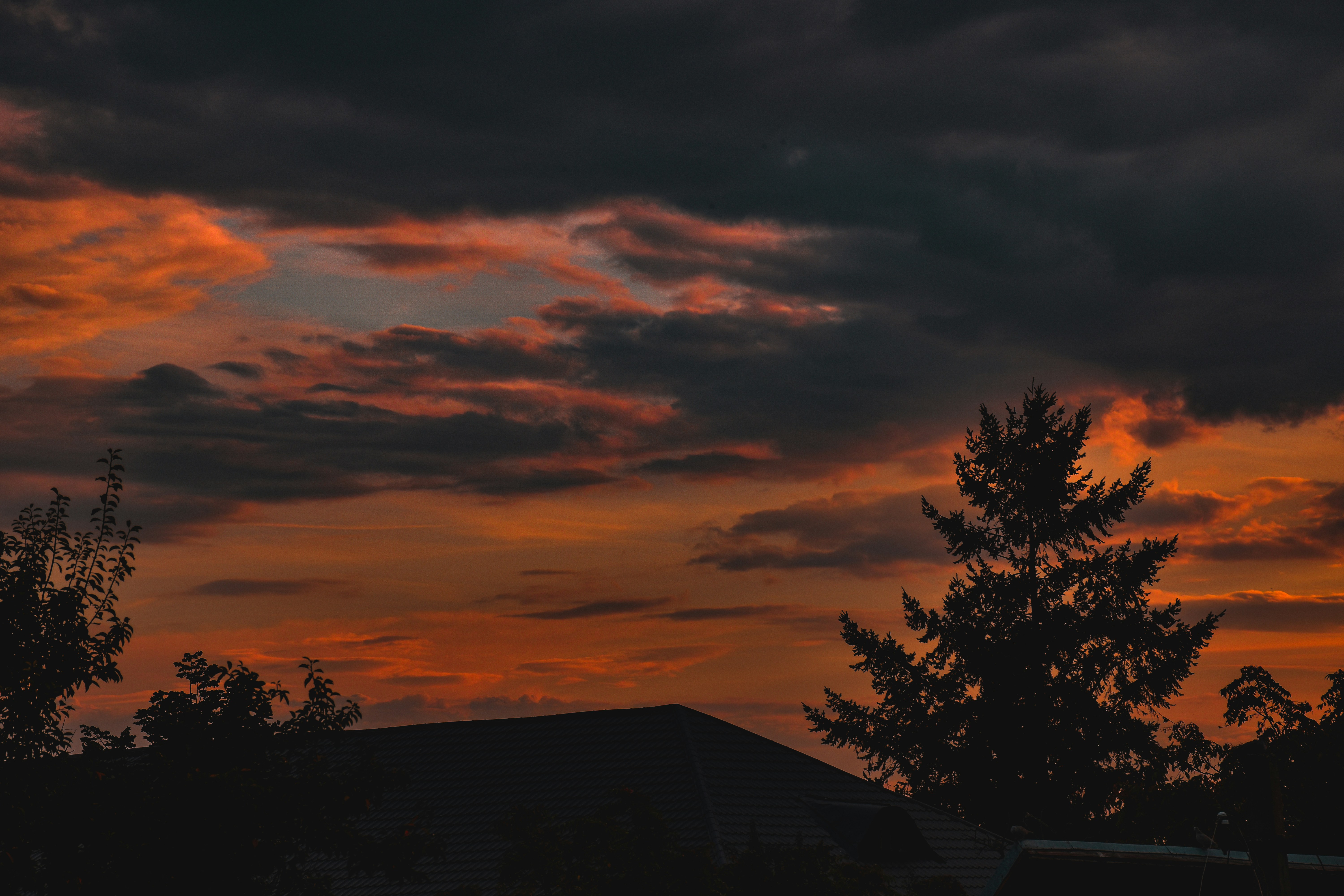 A sunset over a house photo – Free Brown Image on Unsplash