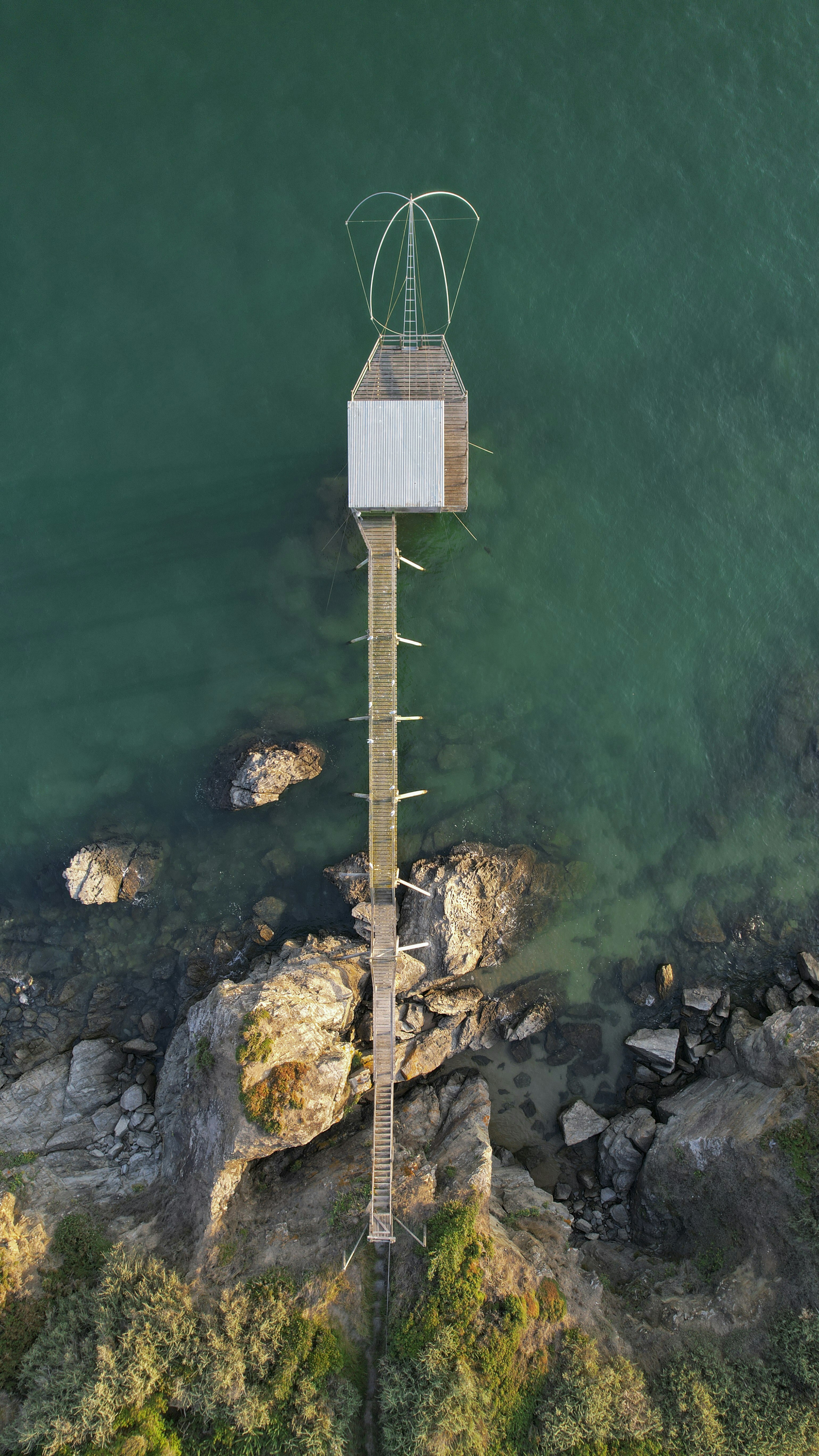 a tower with a satellite dish on top of itDamien Dufour