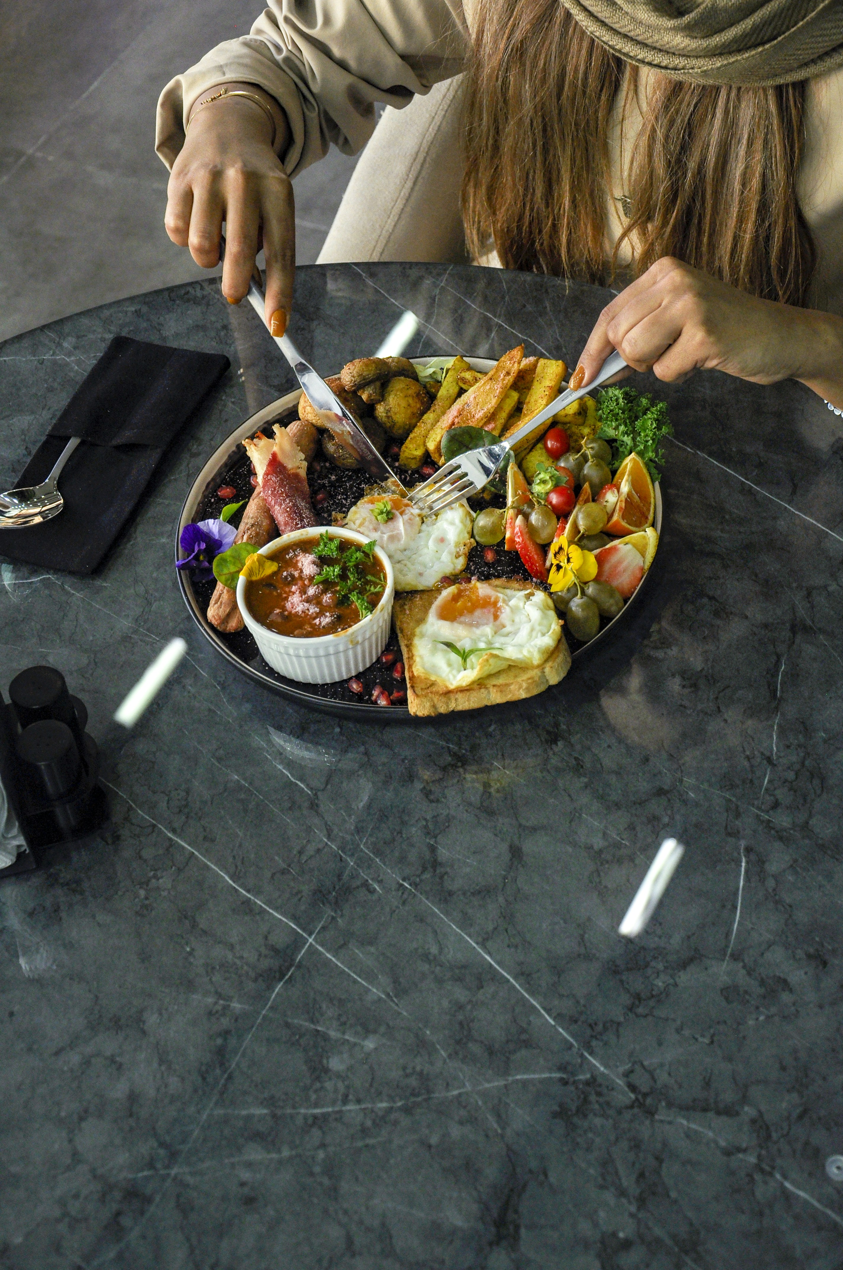 Overhead Gourmet Mosaic: A Colorful Plate Framed on Marble