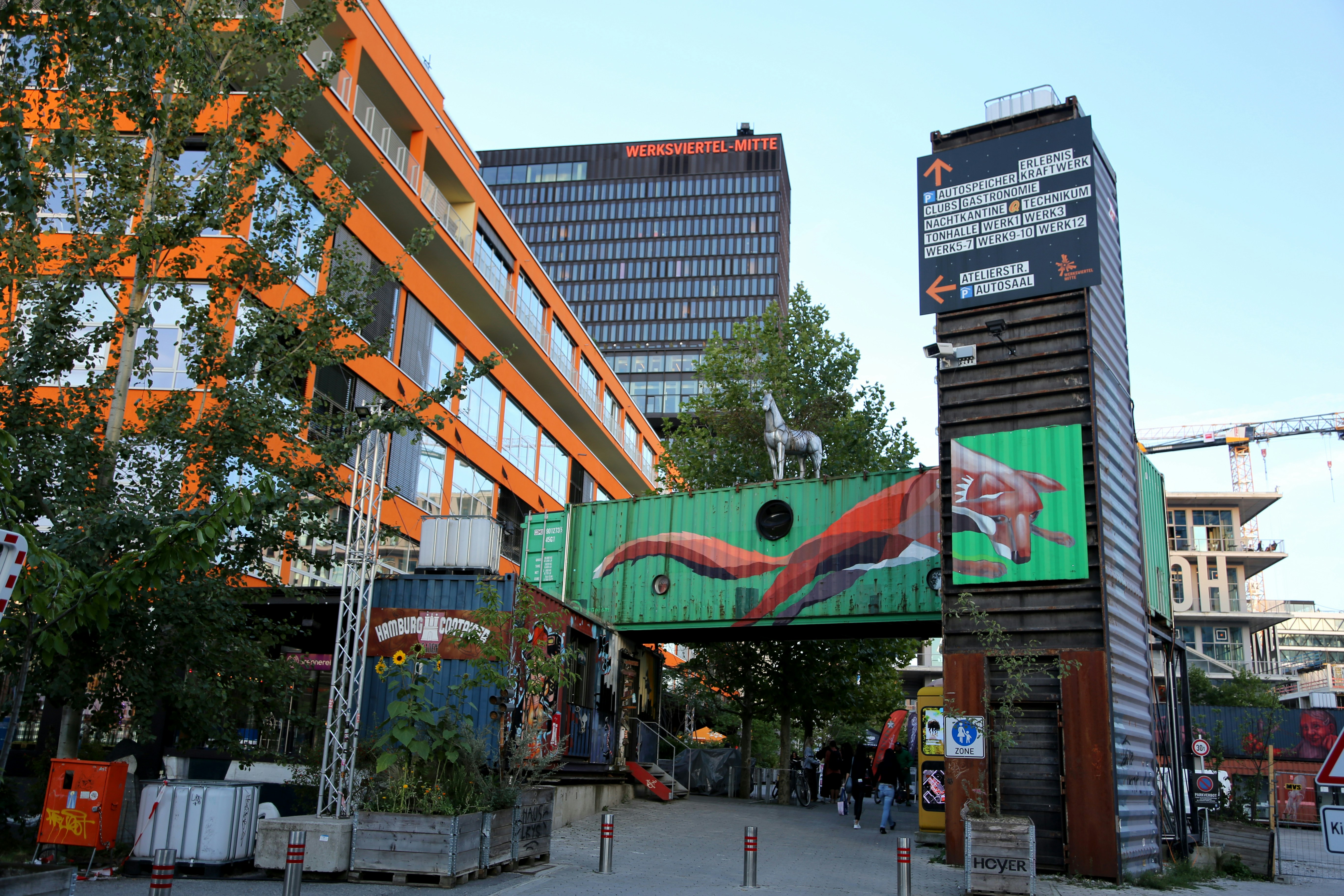 Urban Playground: A Colorful Pedestrian Crossing Under a Painted Archway