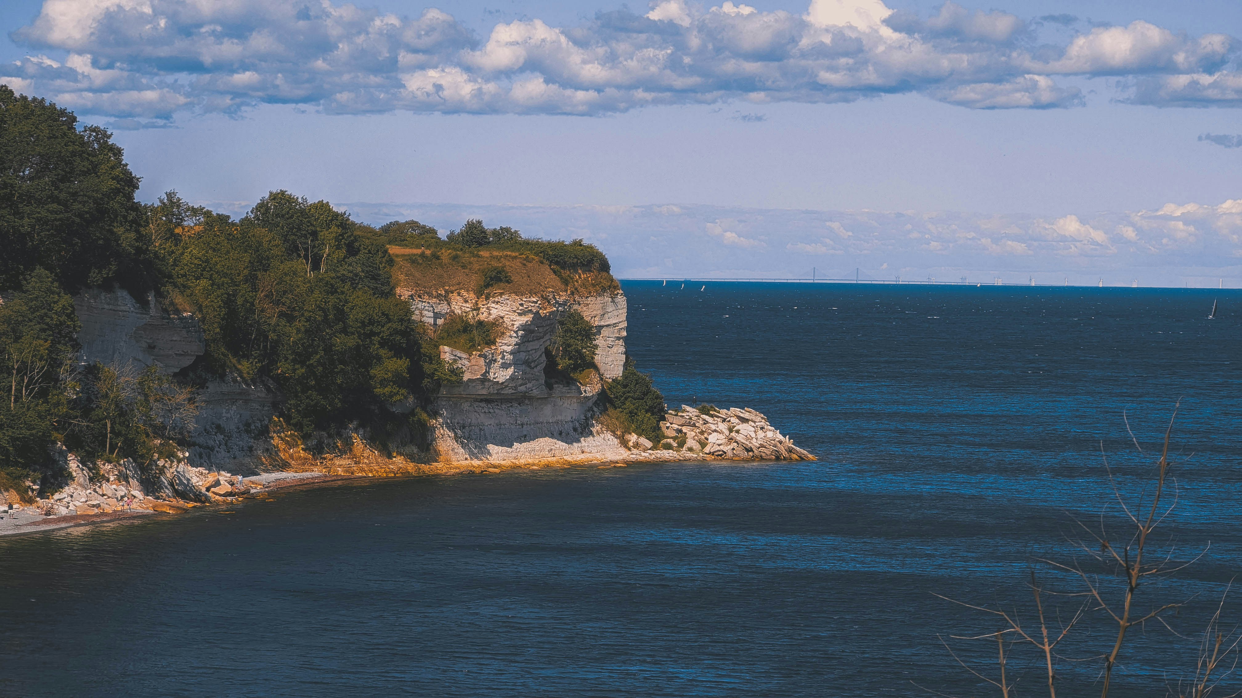 Cliffside Azure: Pines, Chalk, and a Quiet Gulf