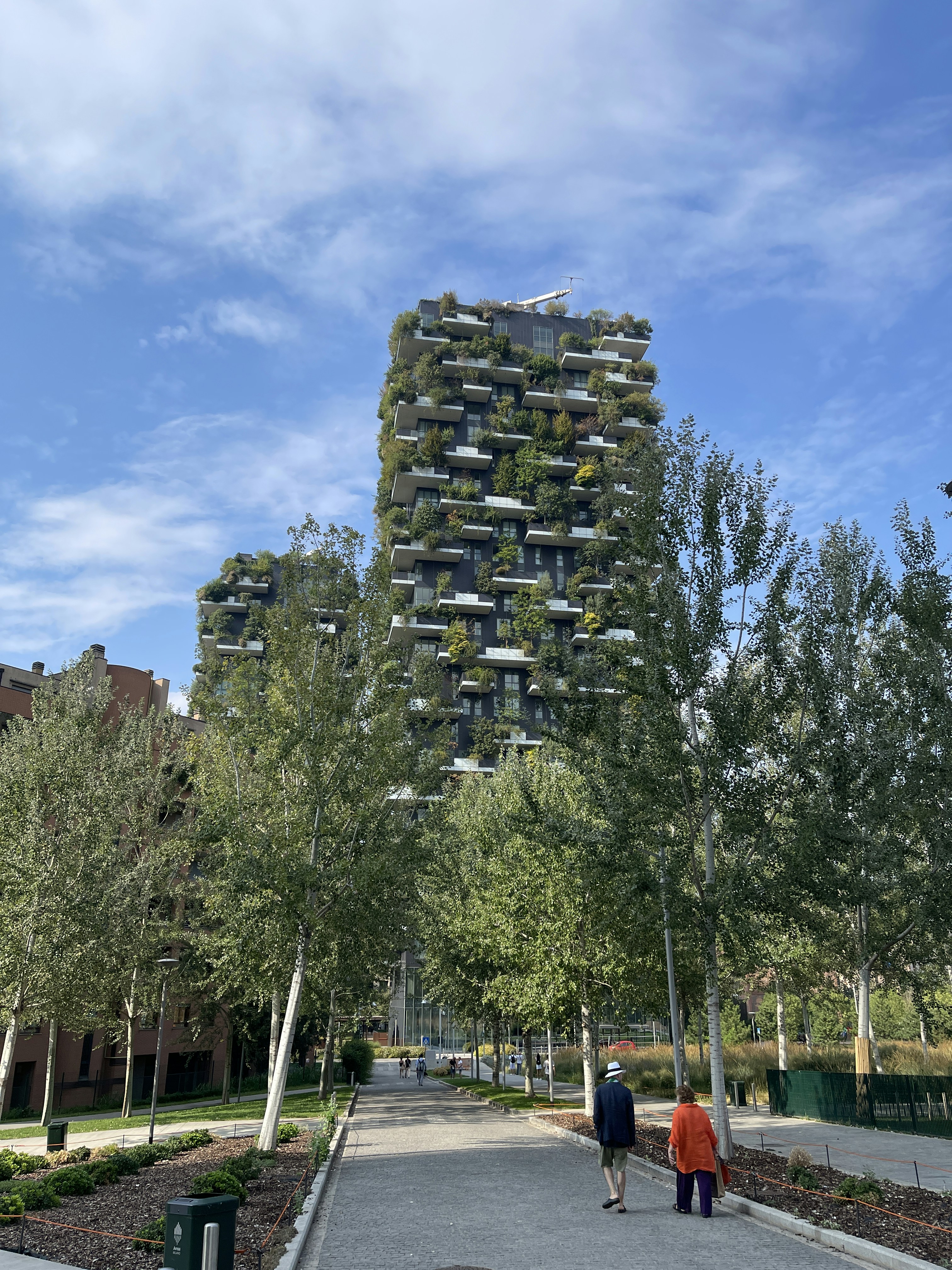 A tall building with trees in front of it photo – Free Milan Image on ...