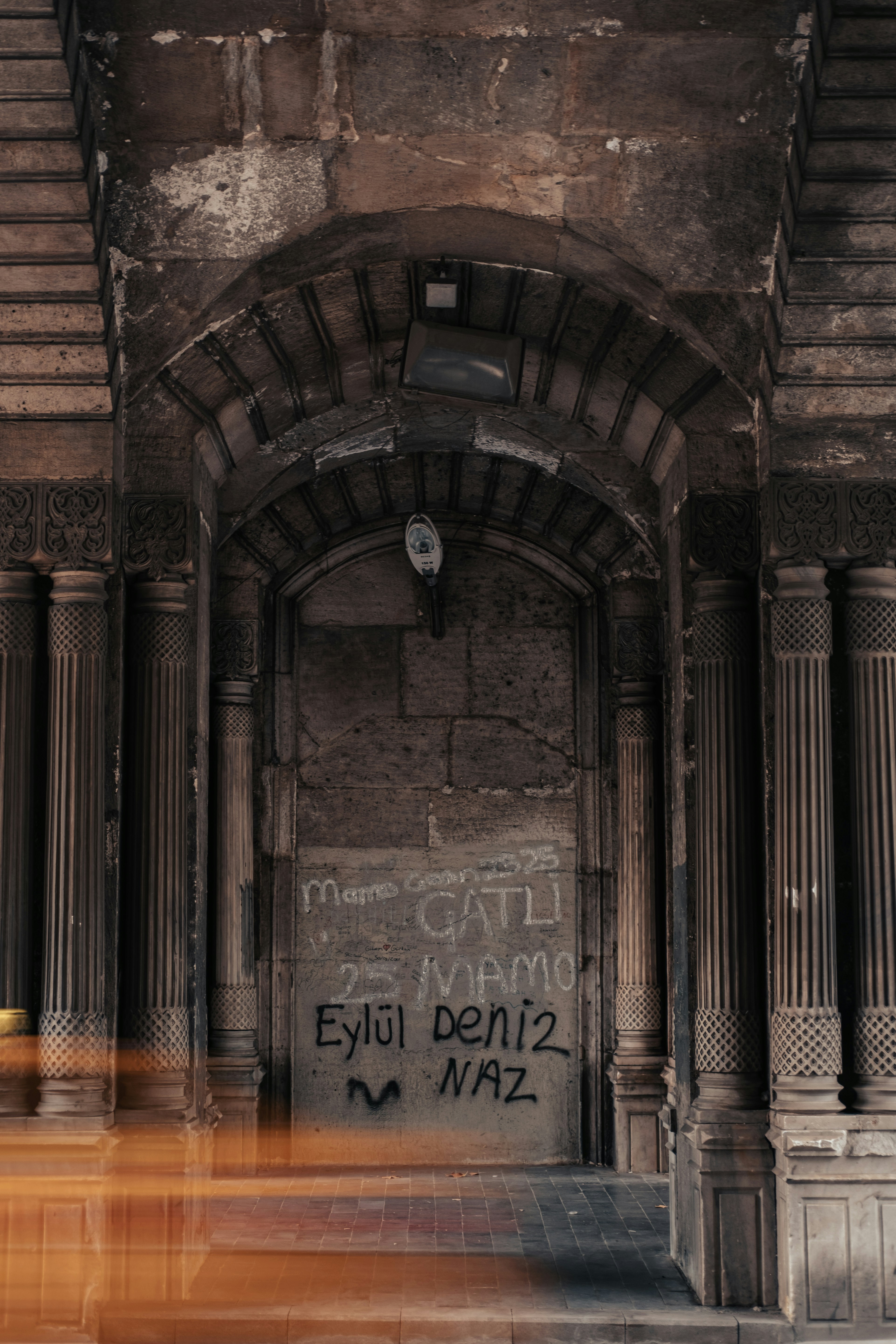Graffiti Gate under Timeworn Arches