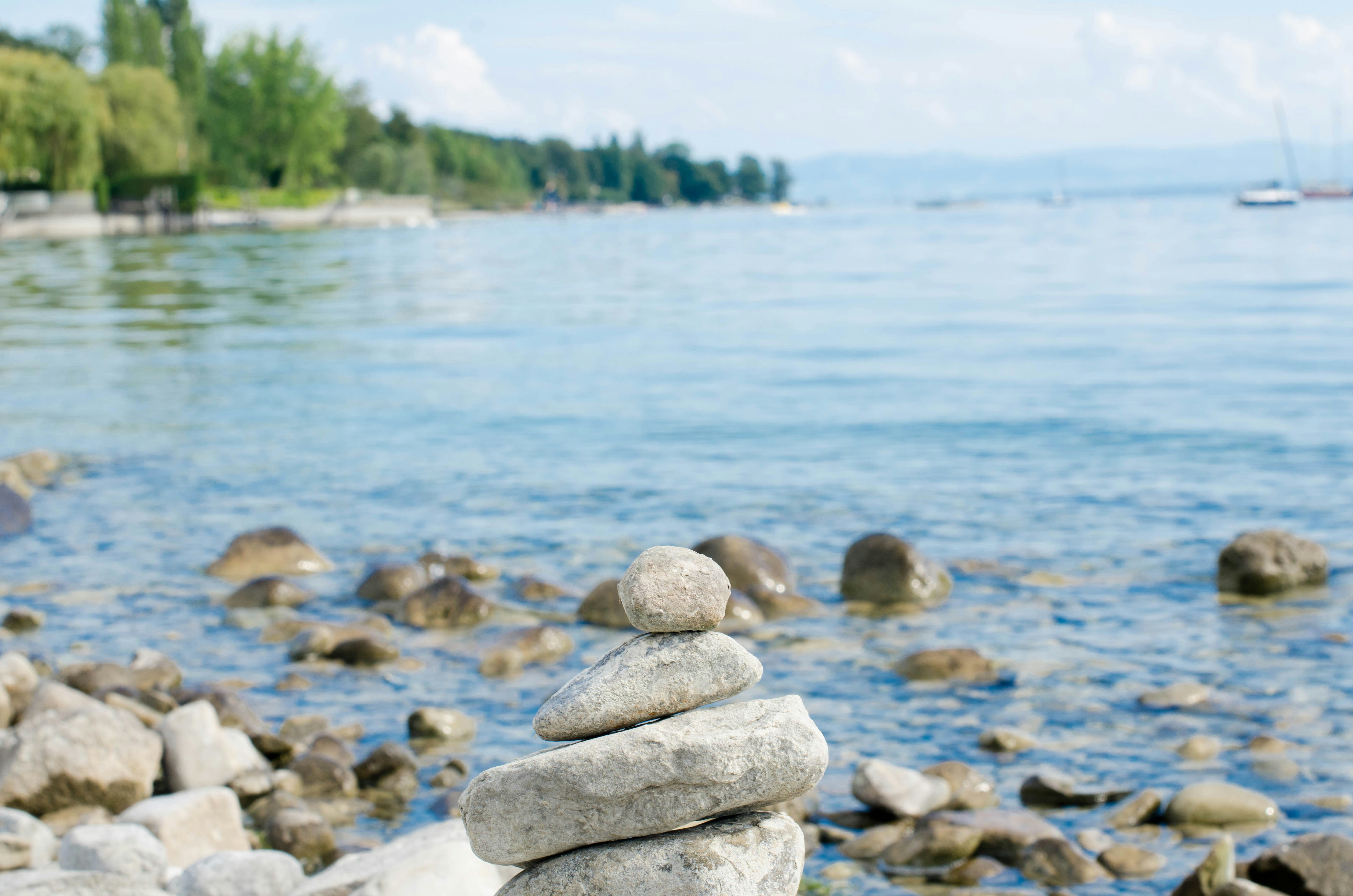 Stacked Stones by a Quiet Lake