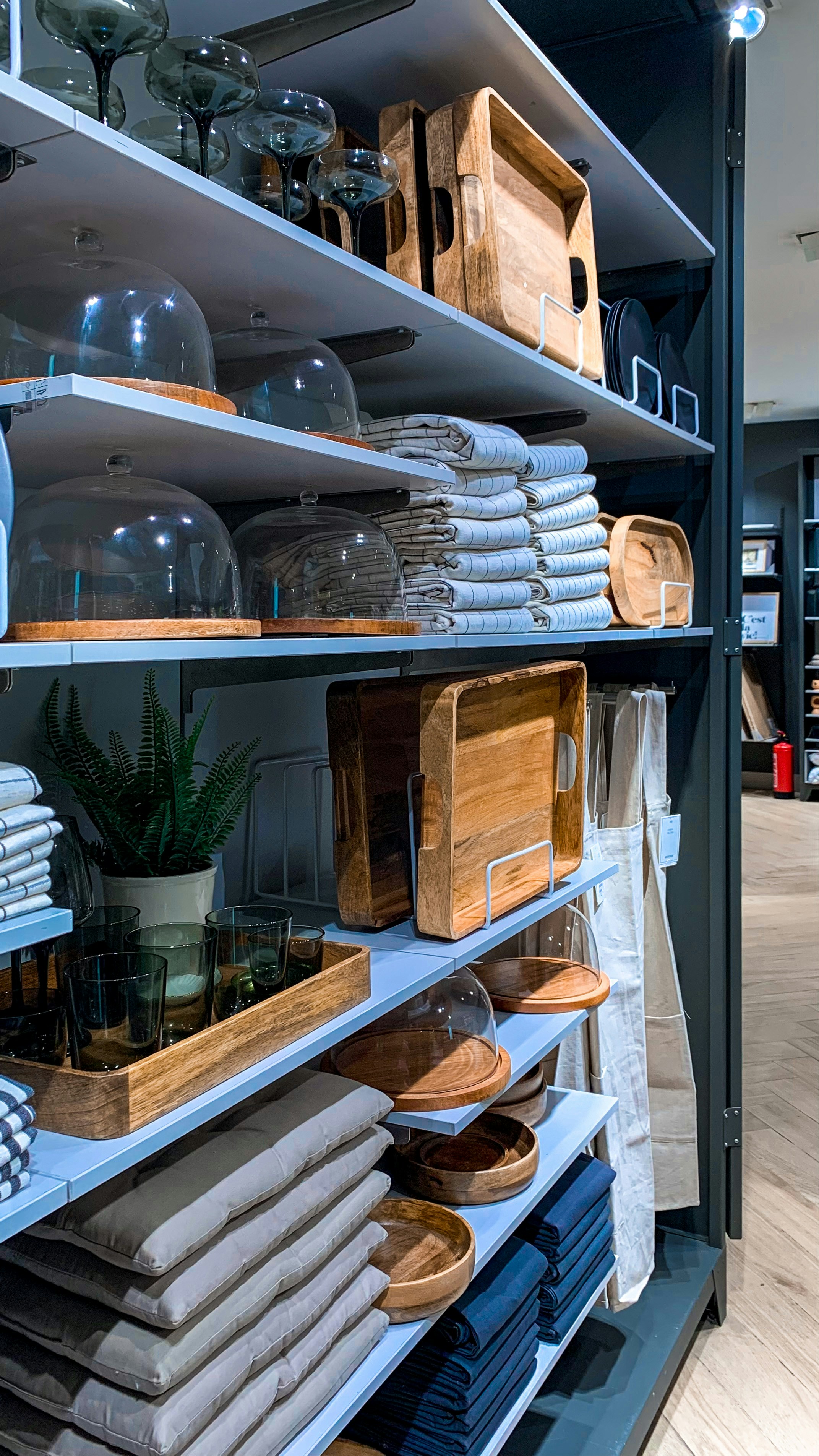 a shelf with dishes and glasses