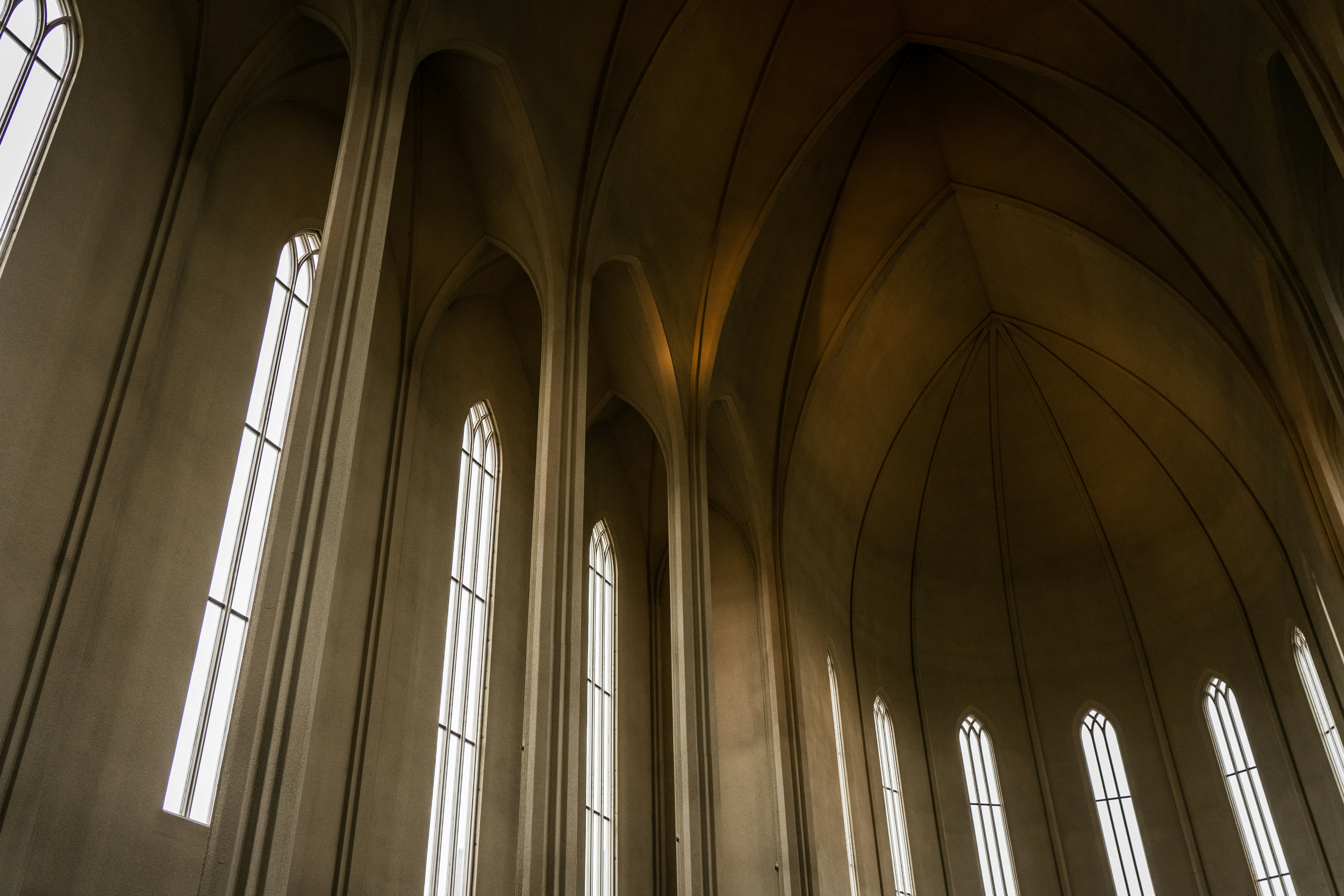 A large arched building with arched windows photo – Free Iceland Image ...