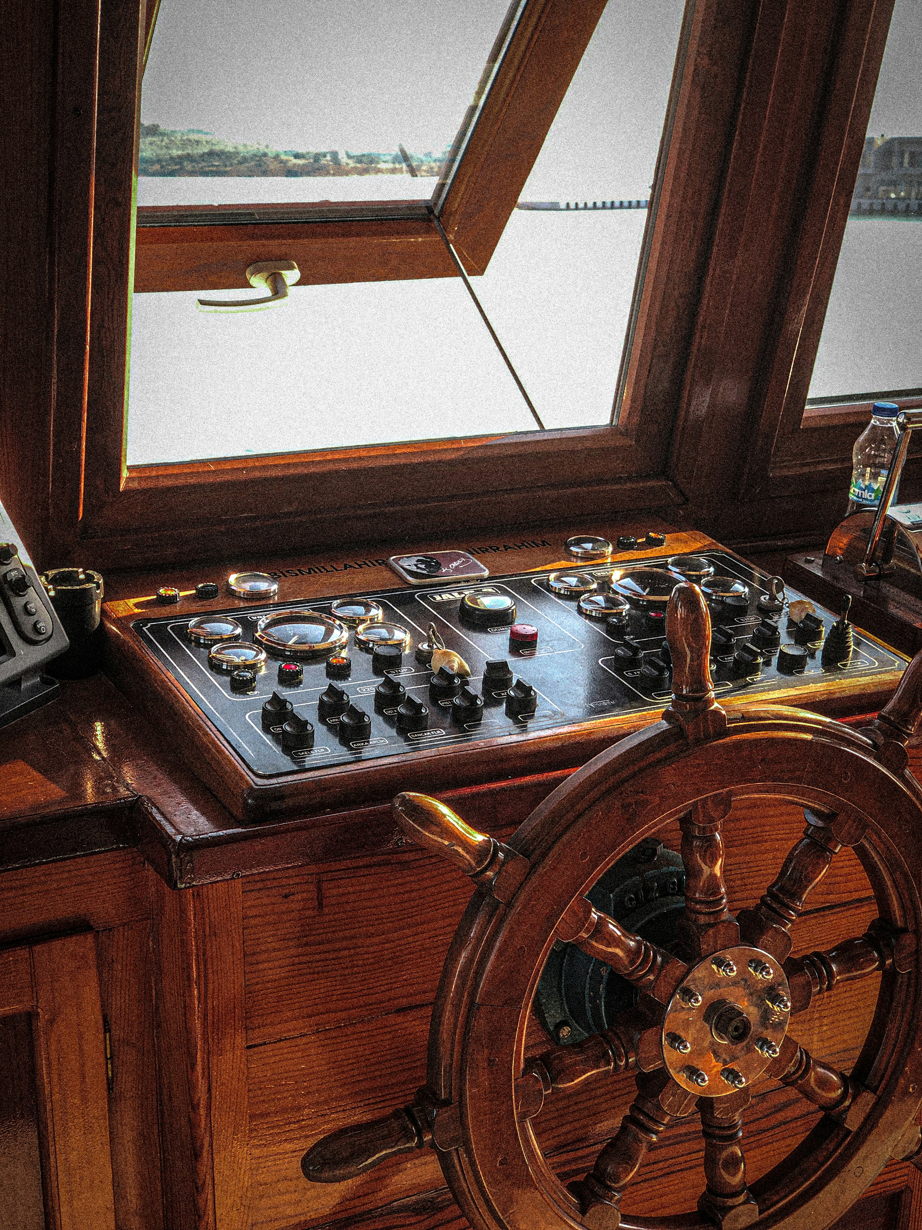 a wooden table with a steering wheel and a steering wheel