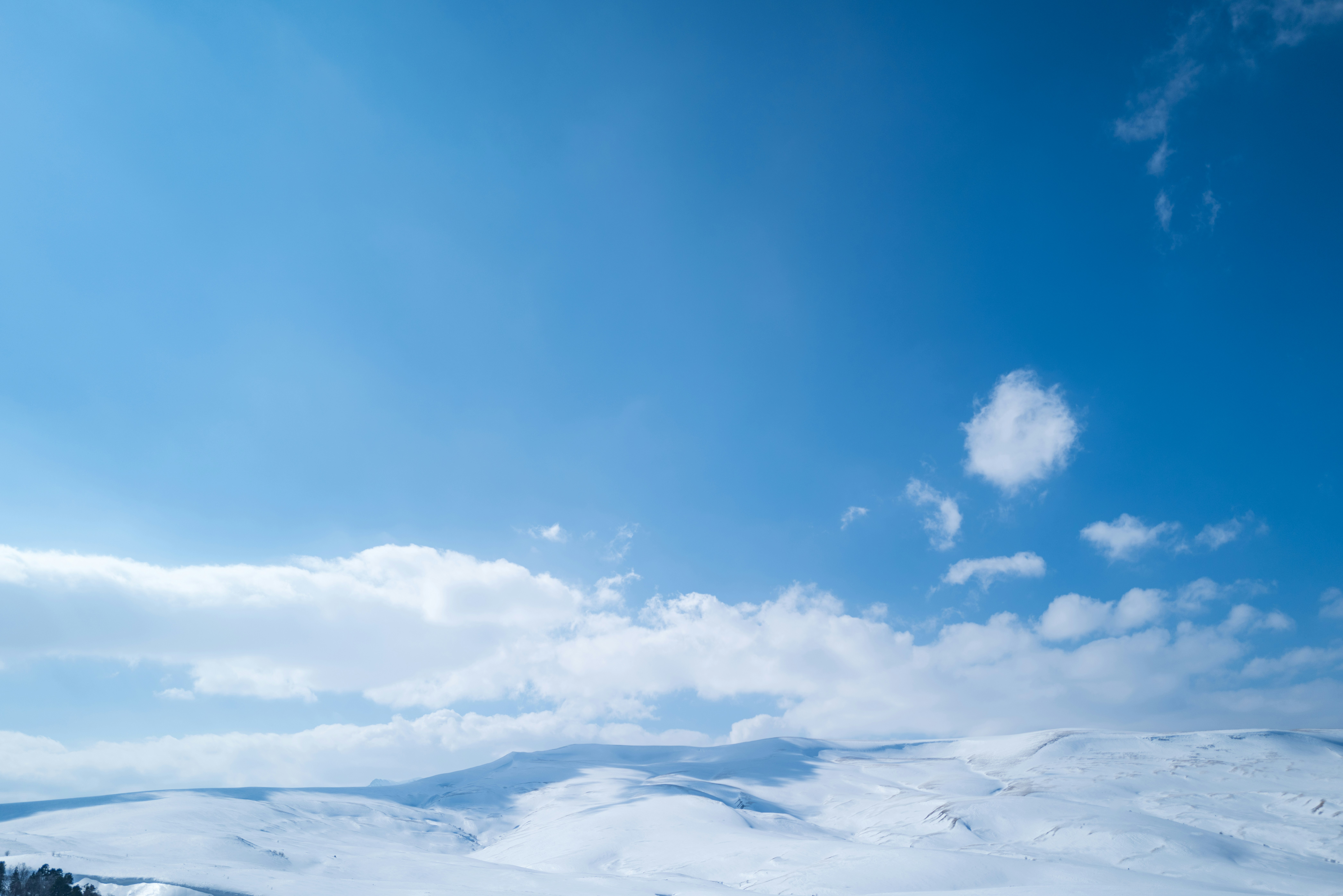 A snowy mountain with blue sky photo – Free Blue Image on Unsplash
