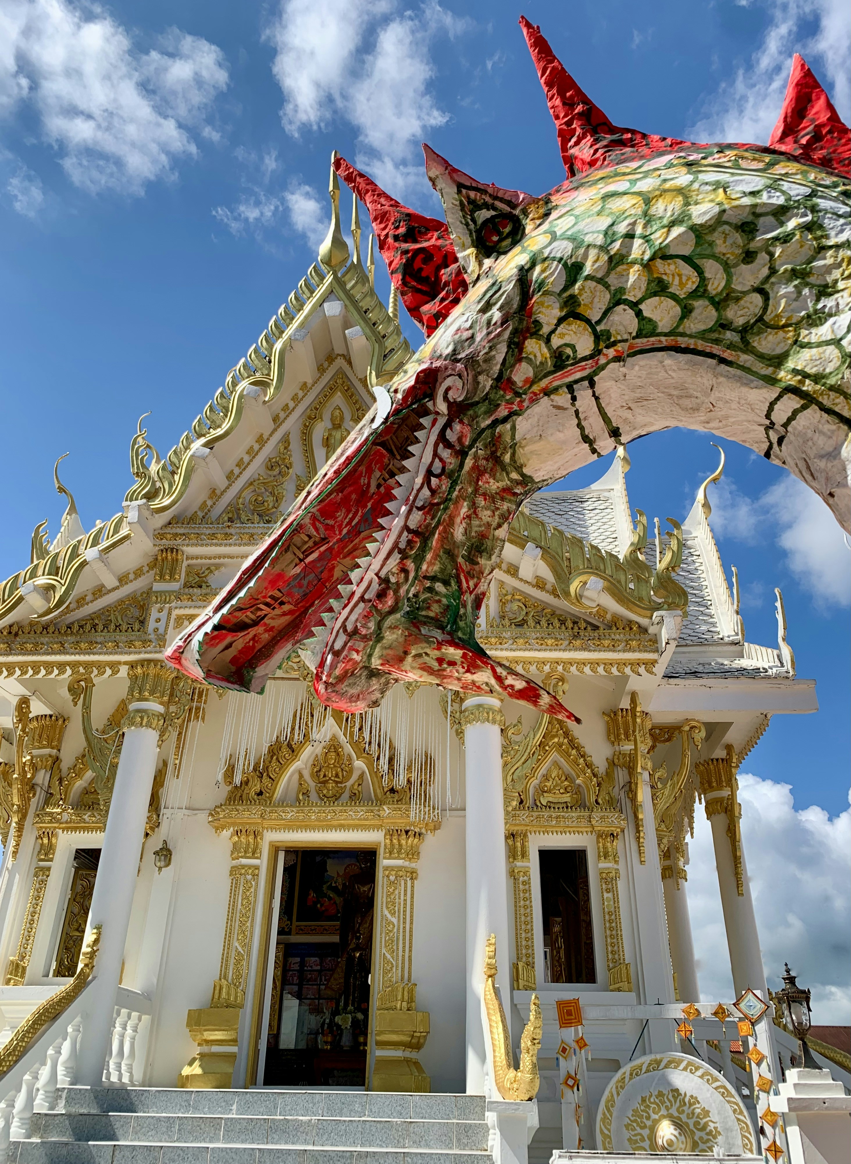 A building with a large dragon roof photo – Free Tha uthen district ...