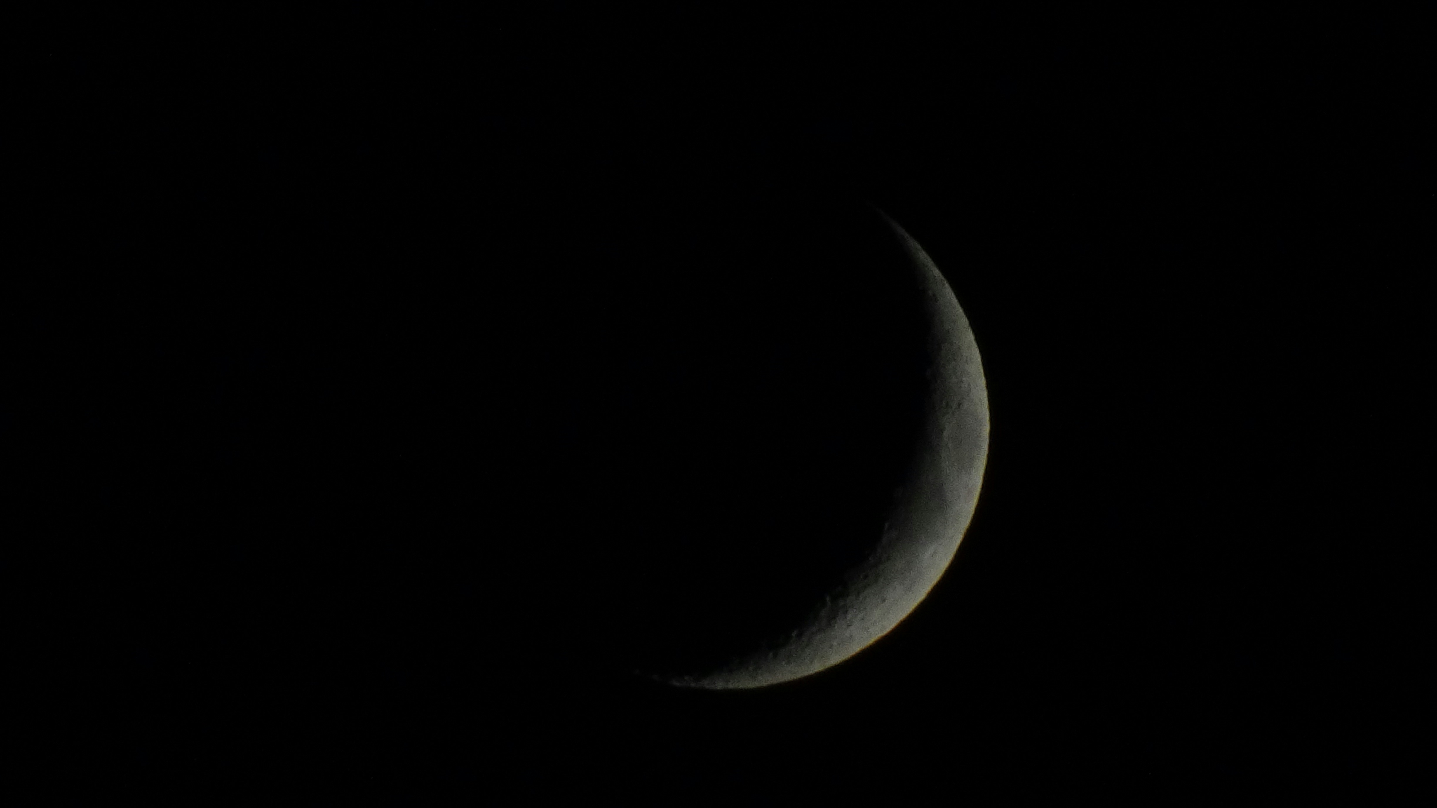 Partial Moon Crescent in a Velvet Night