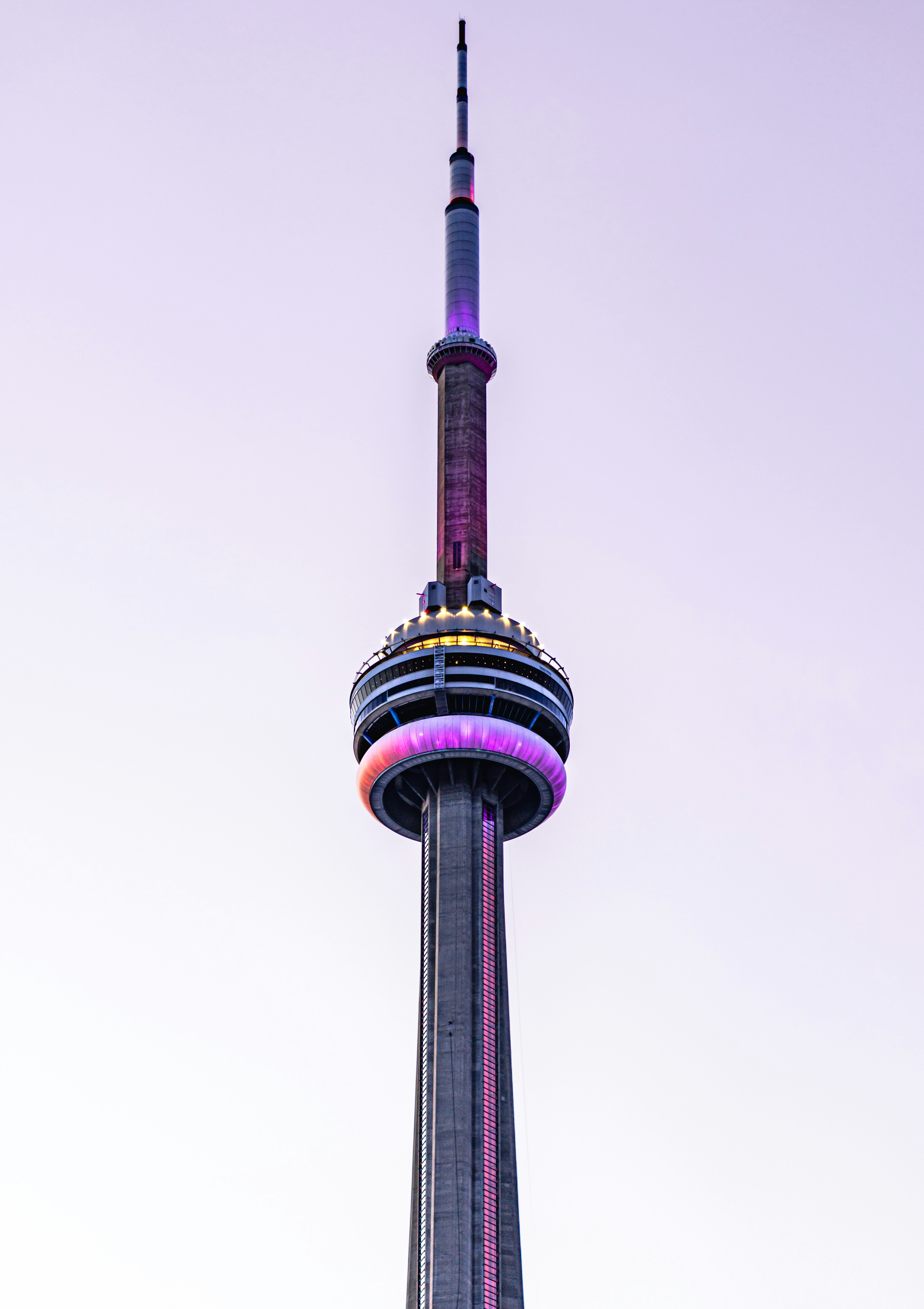 A tall tower with a purple and blue top photo – Free Building Image on ...